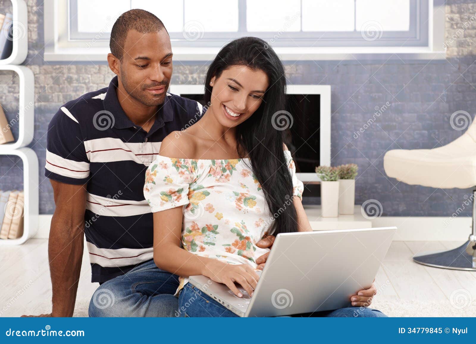 Young Couple Browsing Internet Together Smiling Stock Image - Image of ...