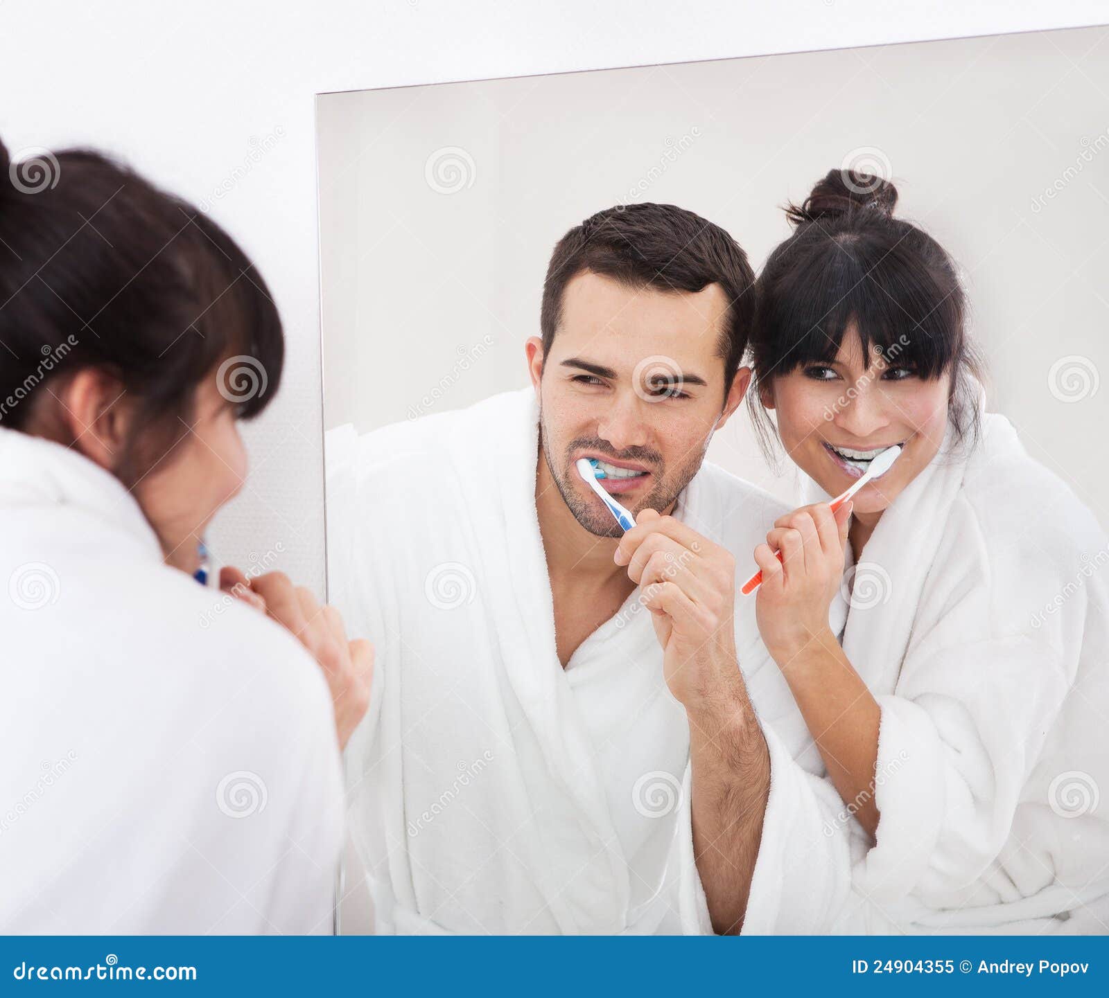 Young Couple Brushing Teeth Stock Image - Image of married, adult: 24904355