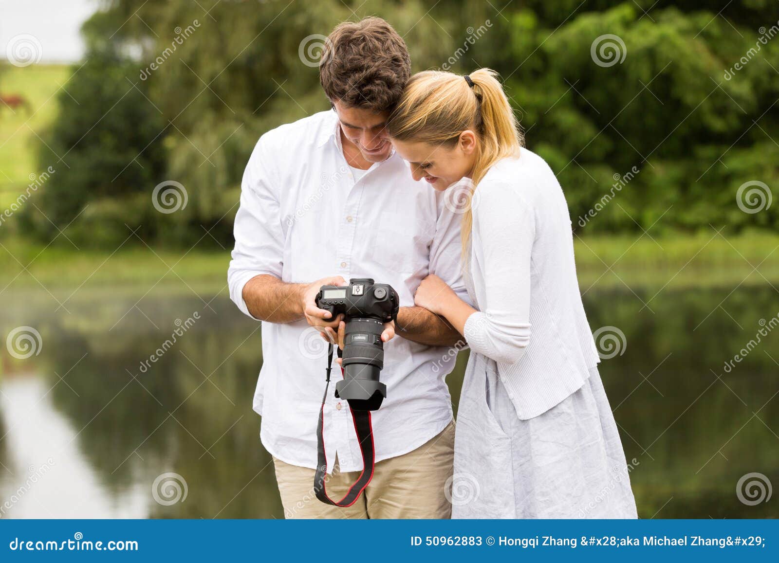 Young couple camera stock image. Image of handsome, nature - 50962883