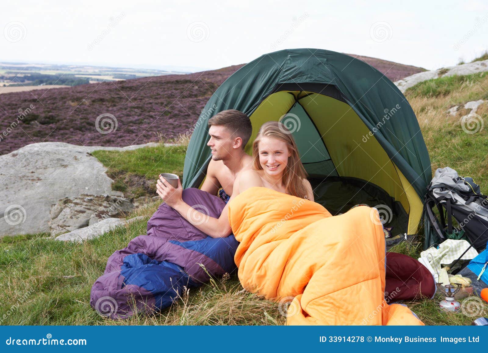 Young Couple on Camping Trip in Countryside Stock Photo - Image of ...