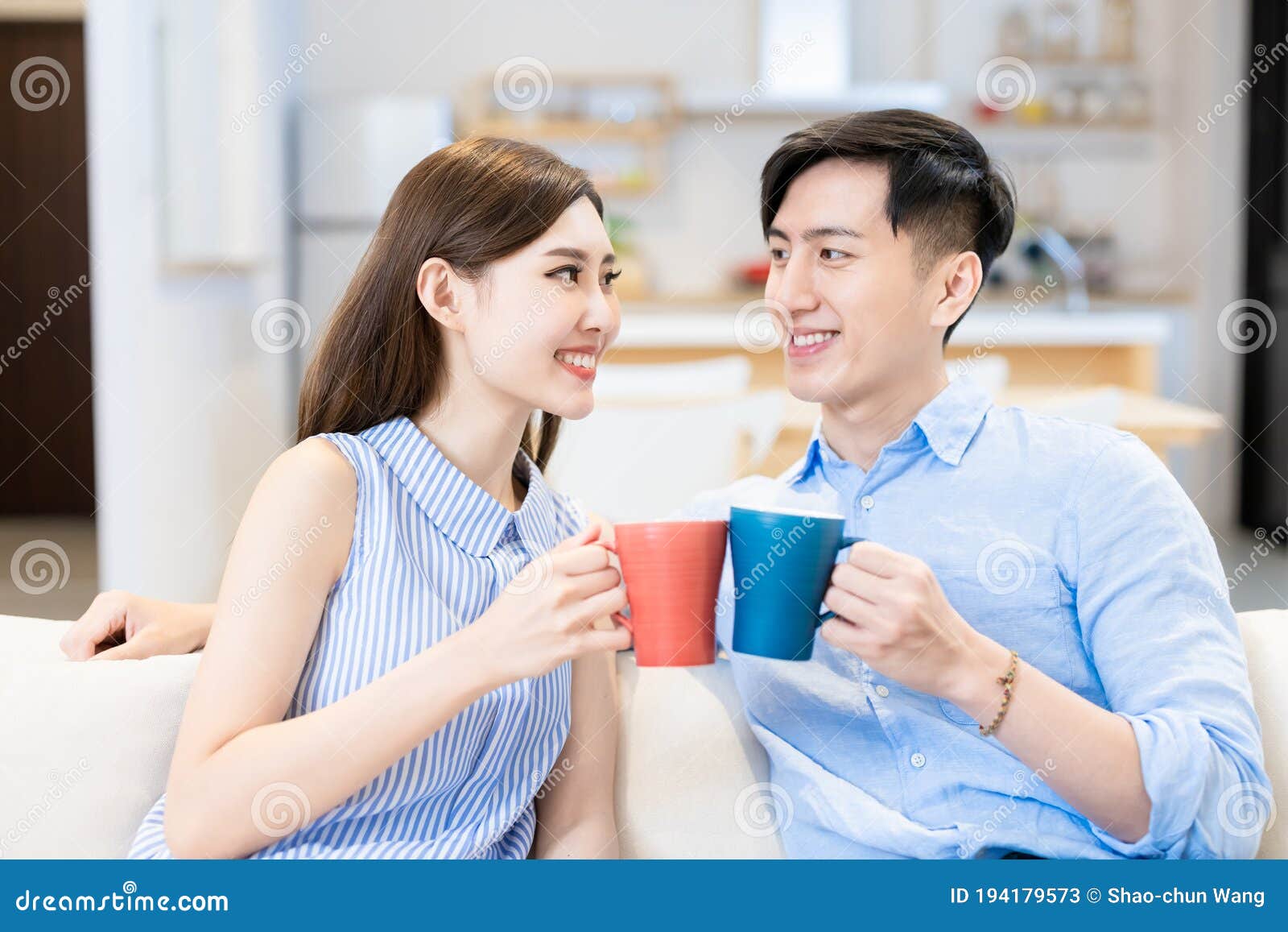 Young Couple Chatting at Home Stock Image - Image of love, drink: 194179573