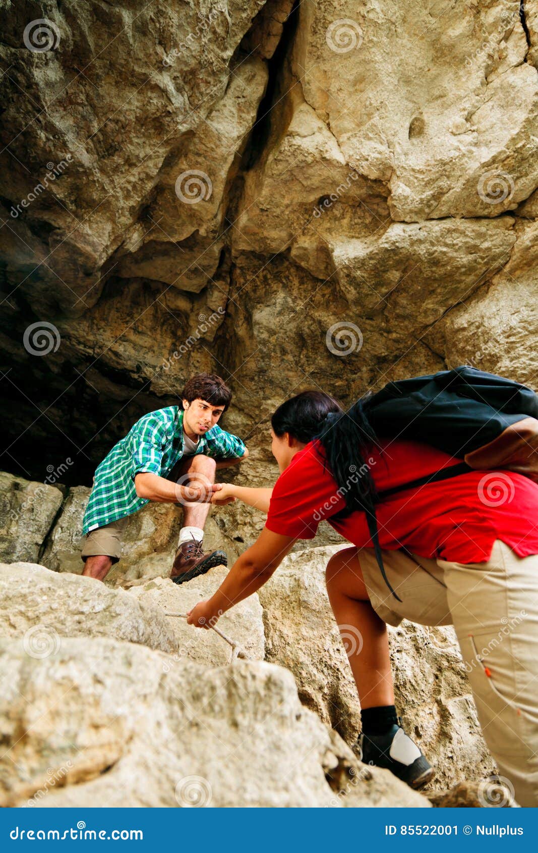 Young Couple Climbing Up a Mountain Stock Image - Image of climbing ...