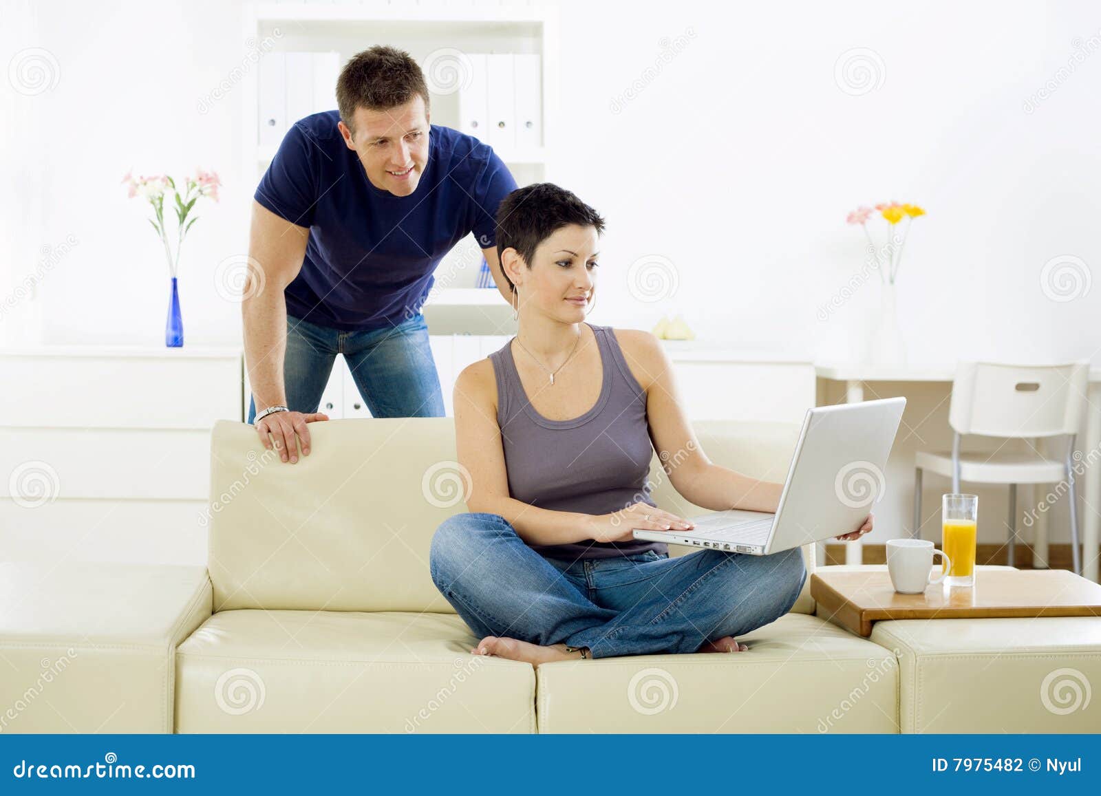 Young couple with computer stock photo. Image of employment - 7975482