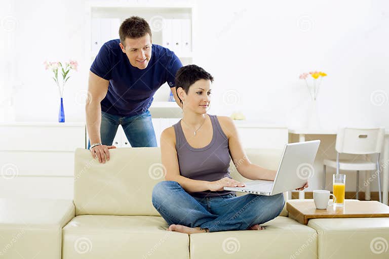 Young couple with computer stock photo. Image of employment - 7975482