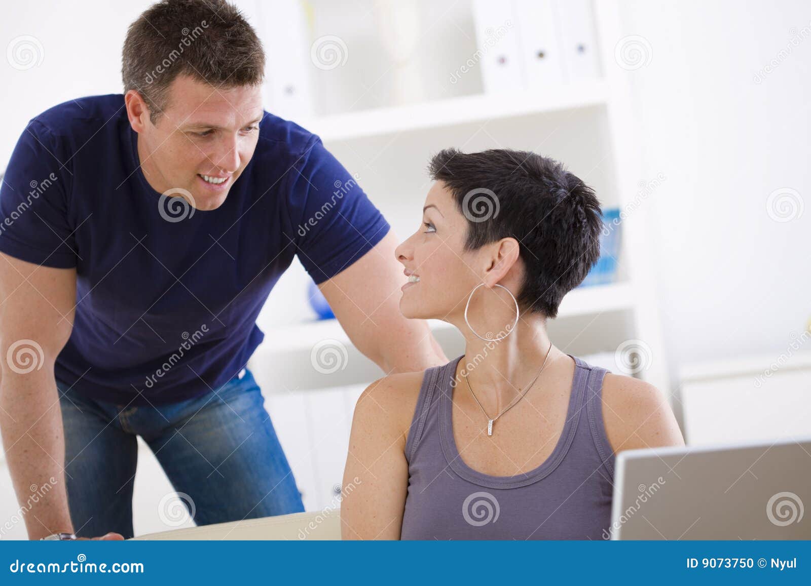 Young couple with computer stock photo. Image of computer - 9073750