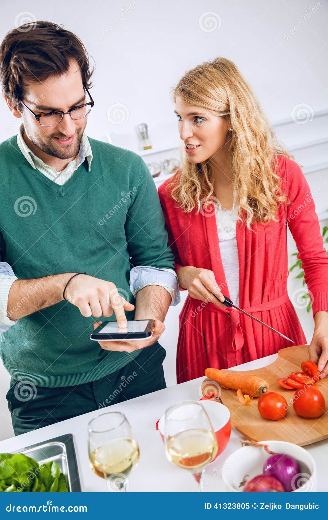Young Couple Cooking Together Stock Image - Image of help, life: 41323805