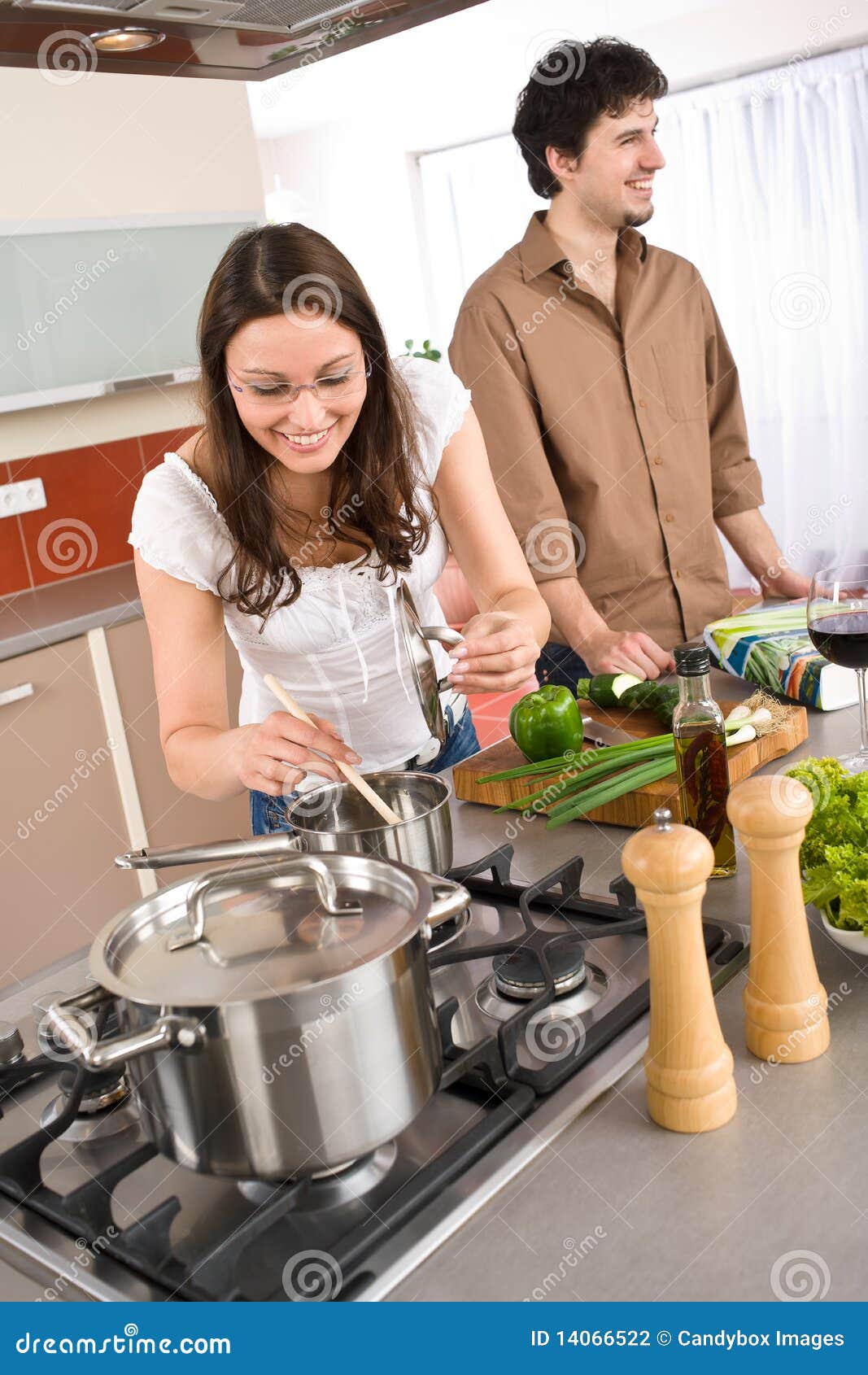 Young Couple Cooking Together in Modern Kitchen Stock Photo - Image of ...