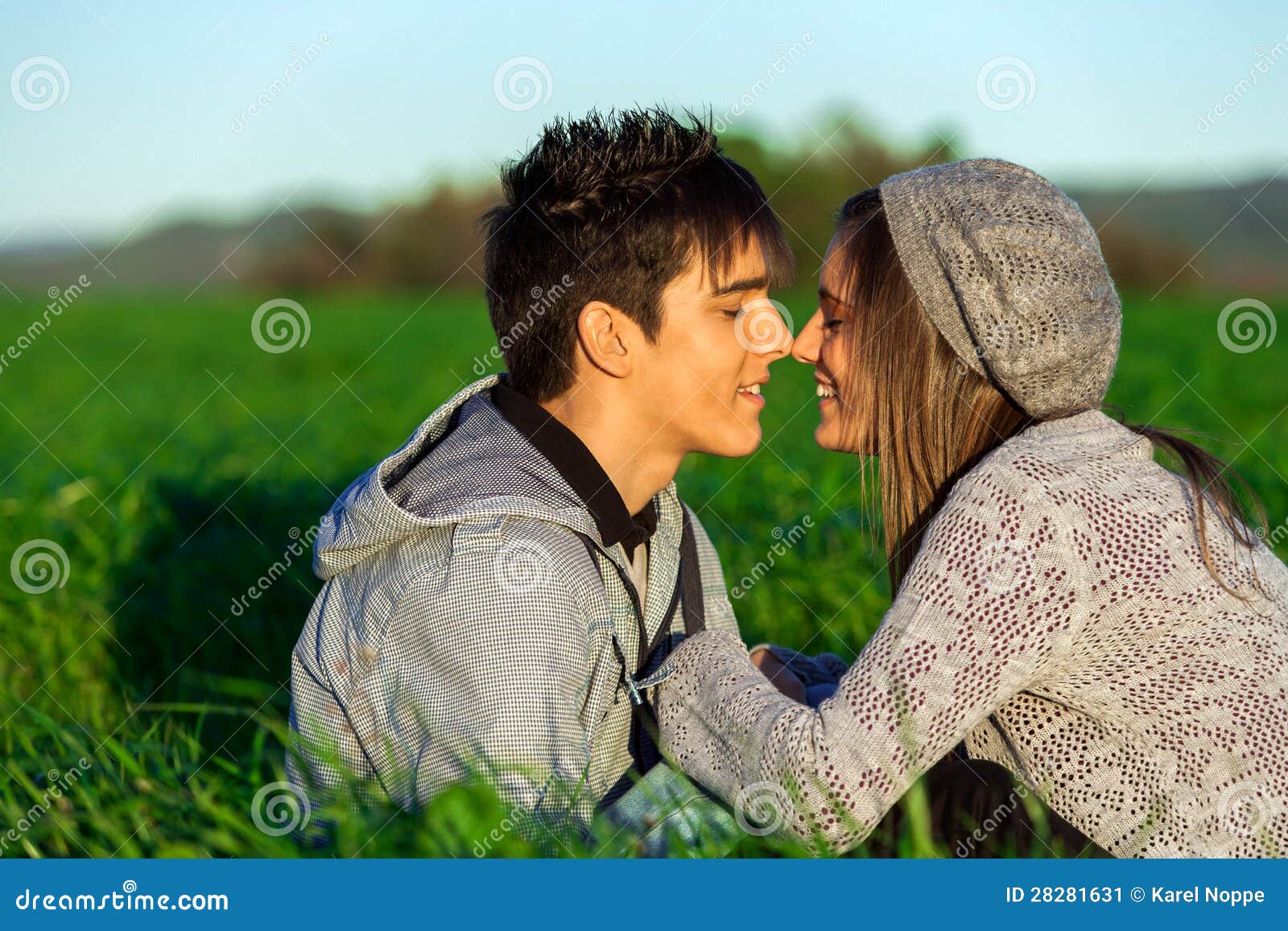 Young Couple in Countryside Showing Affection. Stock Image - Image of ...