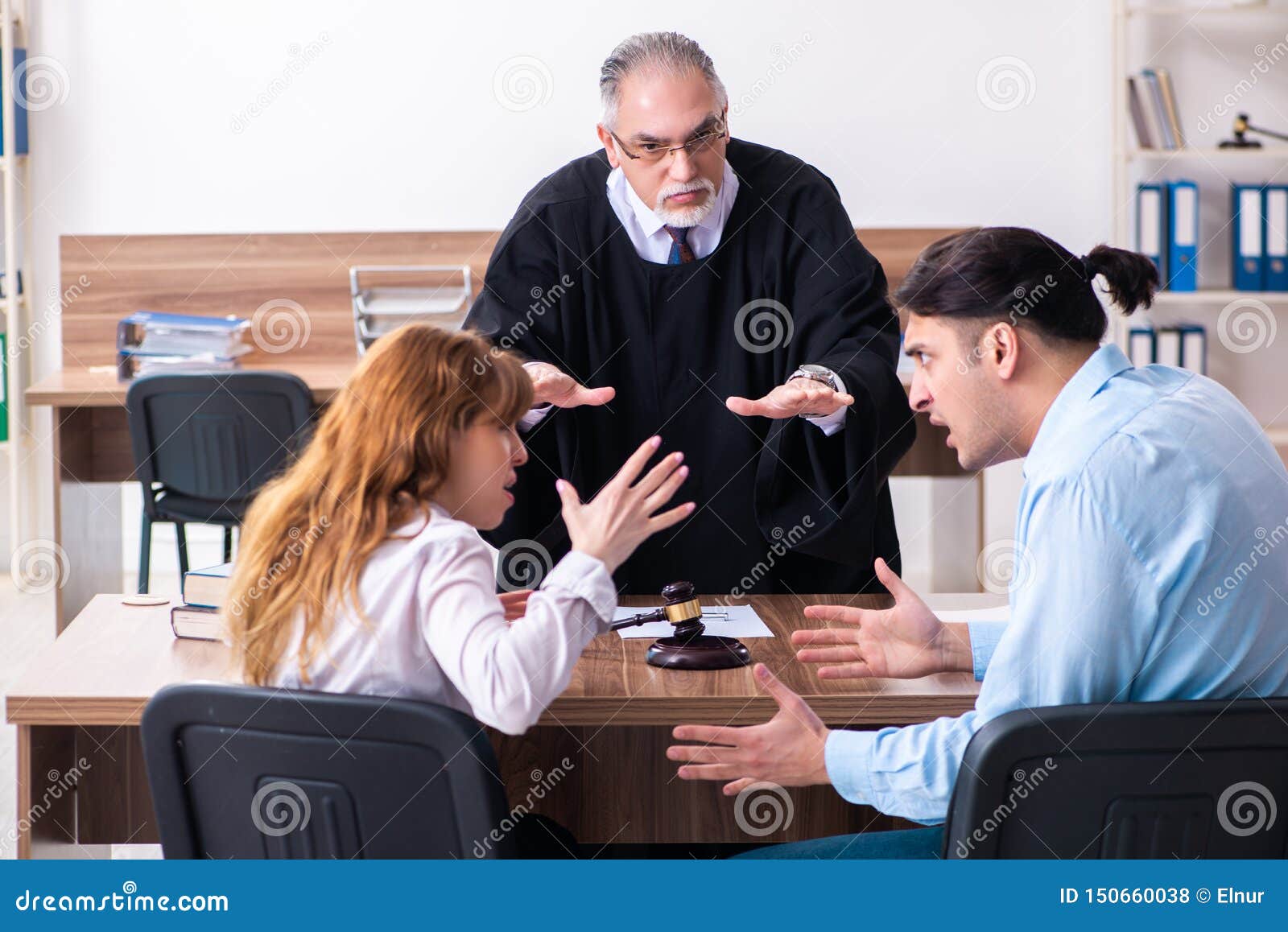 The Young Couple in the Courthouse in Divorce Concept Stock Photo ...