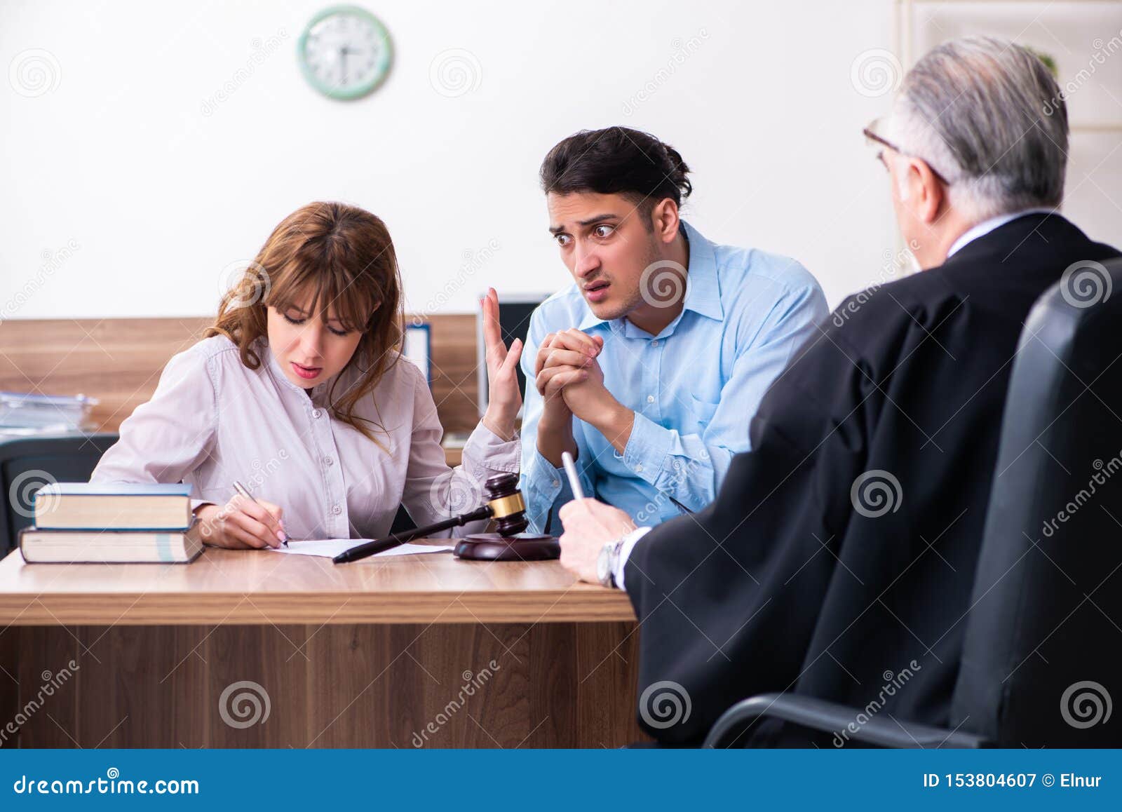 Young Couple in the Courthouse in Divorce Concept Stock Image - Image ...