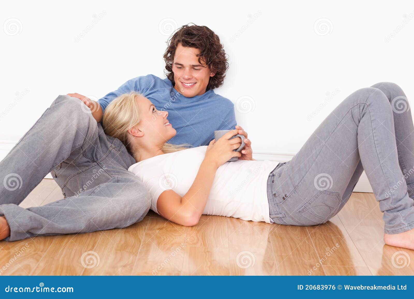 Young Couple Cuddling Each Other Stock Photo - Image of drinking ...