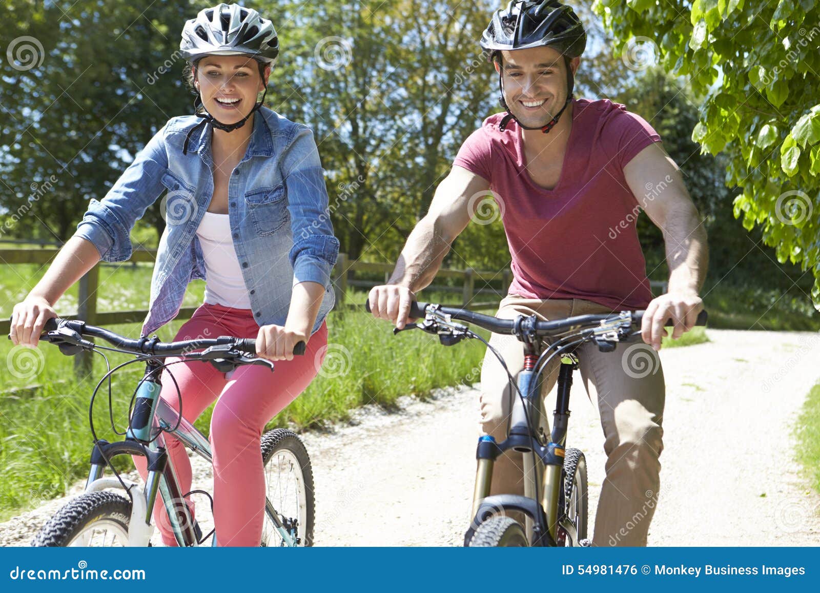 Young Couple on Cycle Ride in Countryside Stock Photo - Image of summer ...