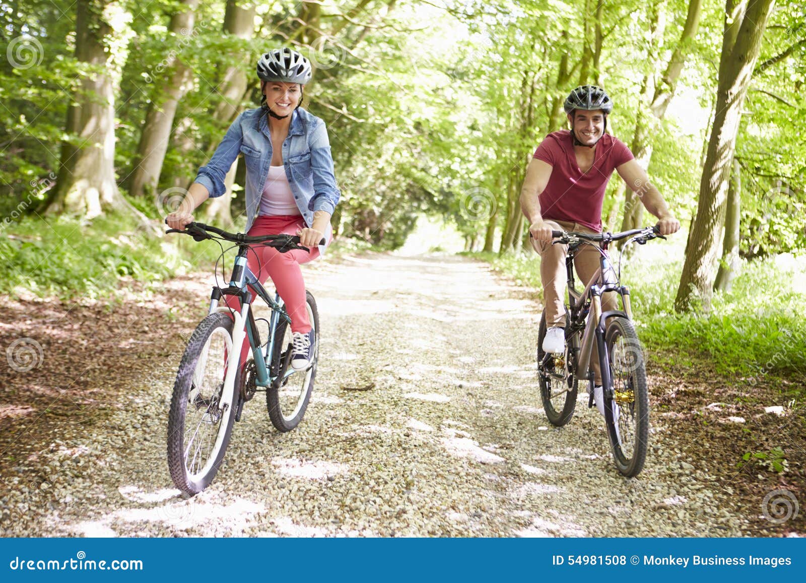 Young Couple on Cycle Ride in Countryside Stock Photo - Image of women ...