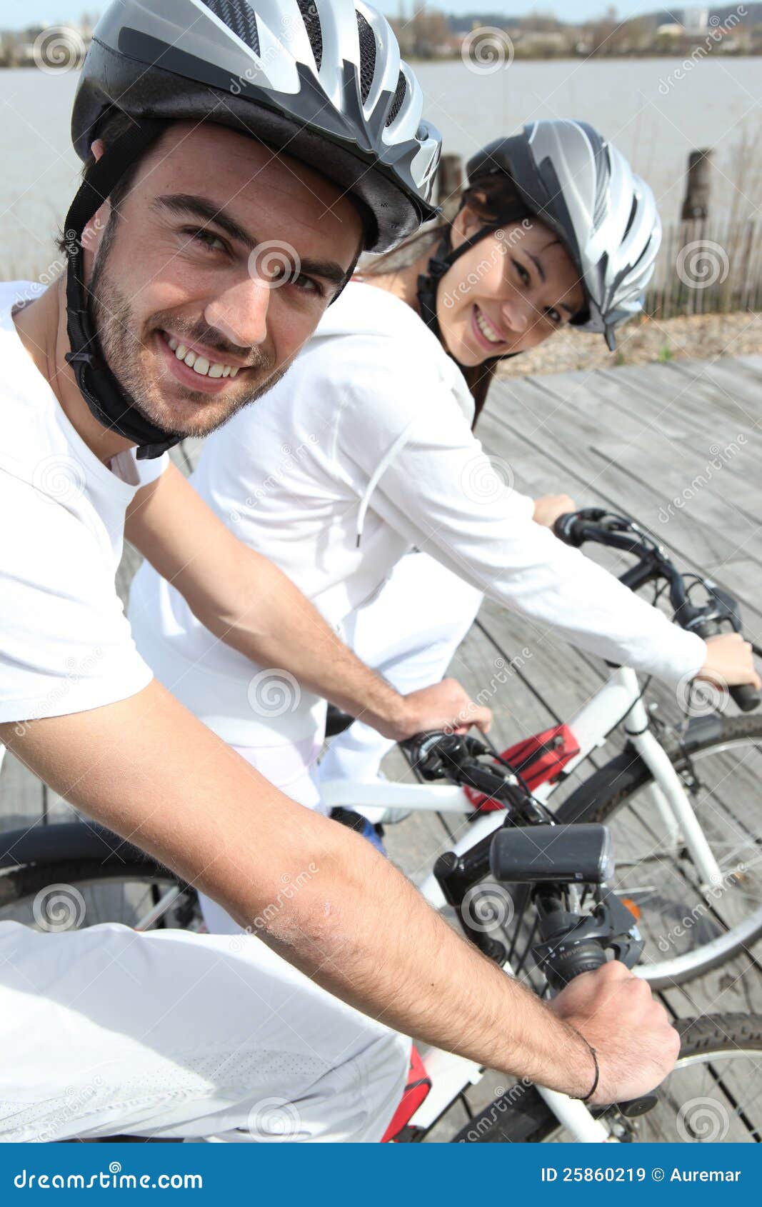 Young couple cycling stock image. Image of bordeaux, bicycle - 25860219