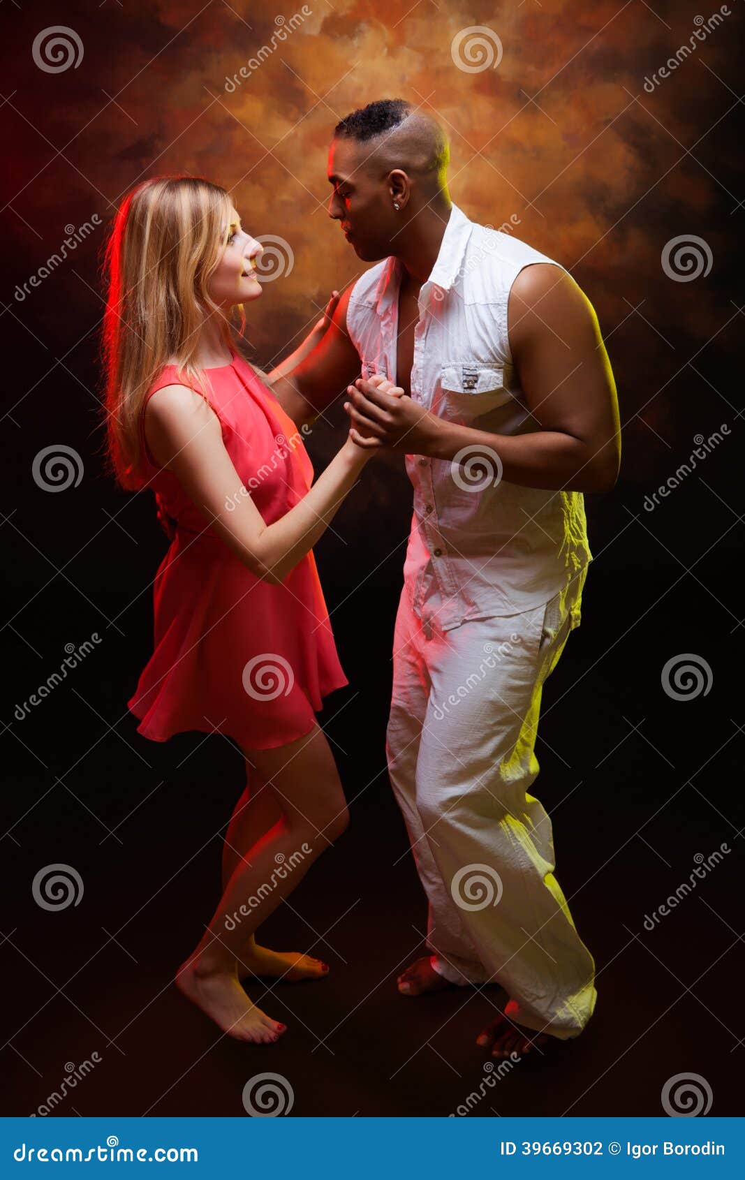 Young Couple Dances Caribbean Salsa Stock Photo - Image of dress ...