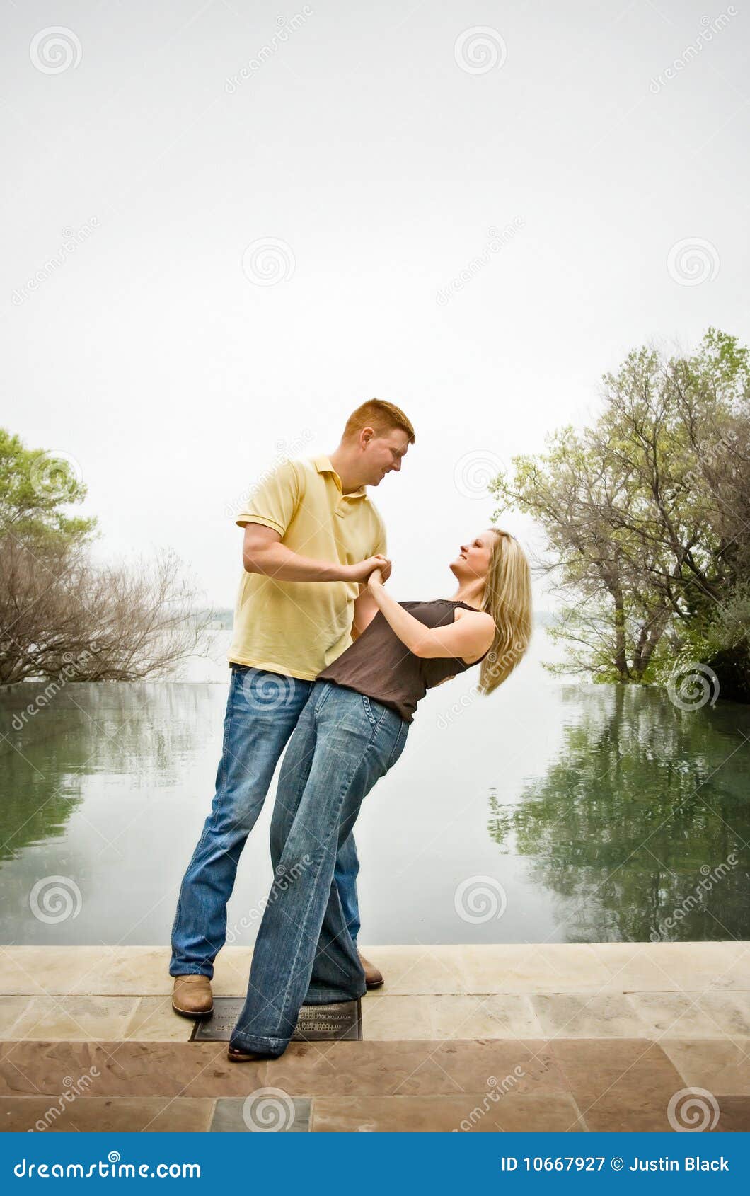 Young Couple Dancing stock image. Image of affectionate - 10667927