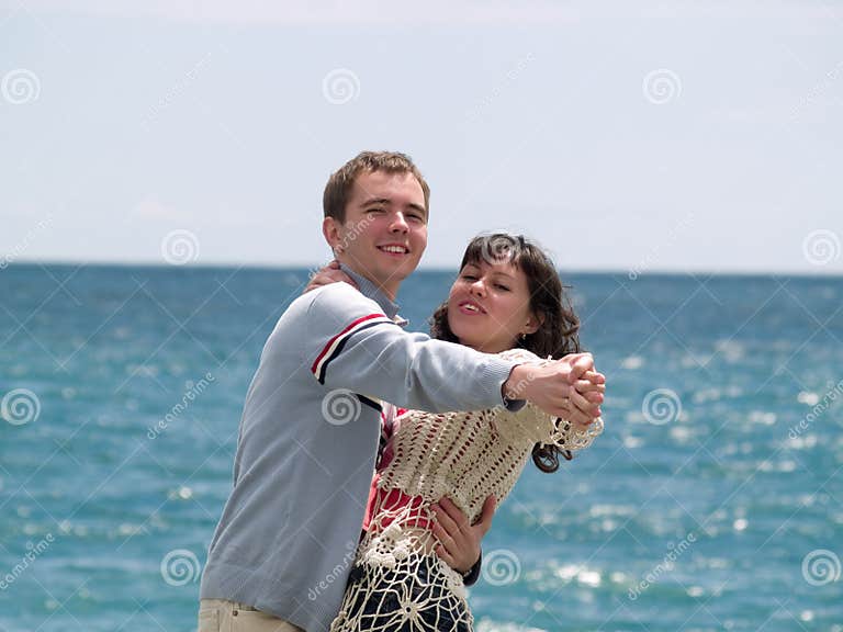 Young Couple Dancing on Beach Stock Image - Image of couple, passion ...