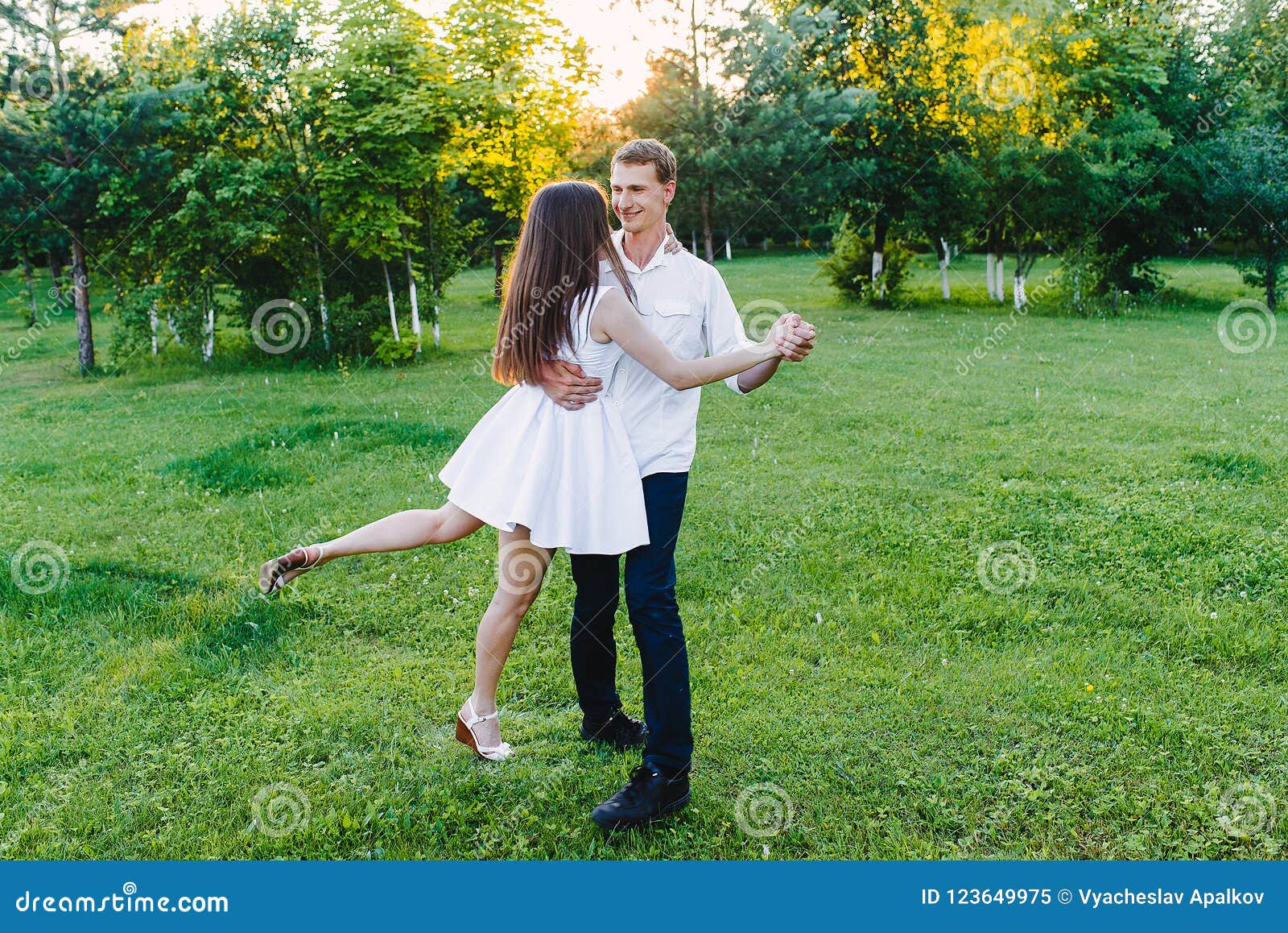 Young Couple Dancing Sweetly on a Grass Stock Image - Image of nature ...