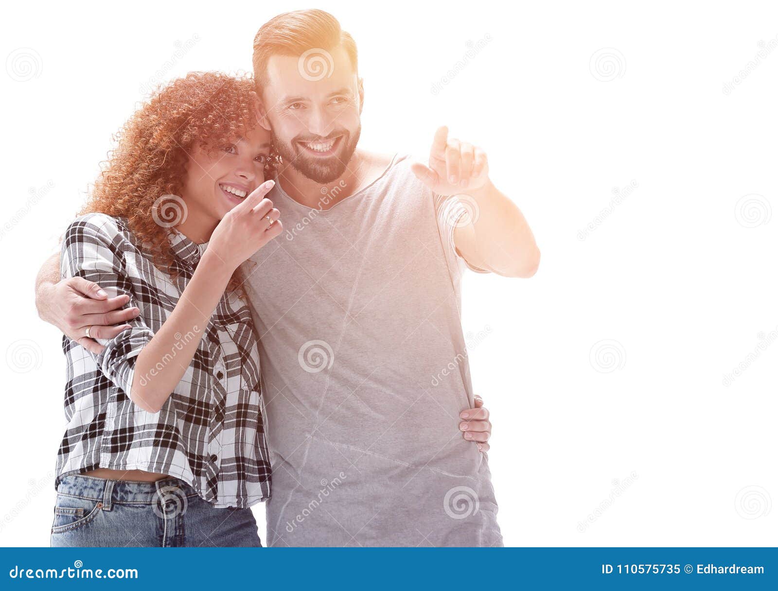 Young Couple Discussing Their Dreams and Pointing Forward. Stock Image ... Young Couple Discussing Their Dreams and Pointing Forward. Stock Image ...