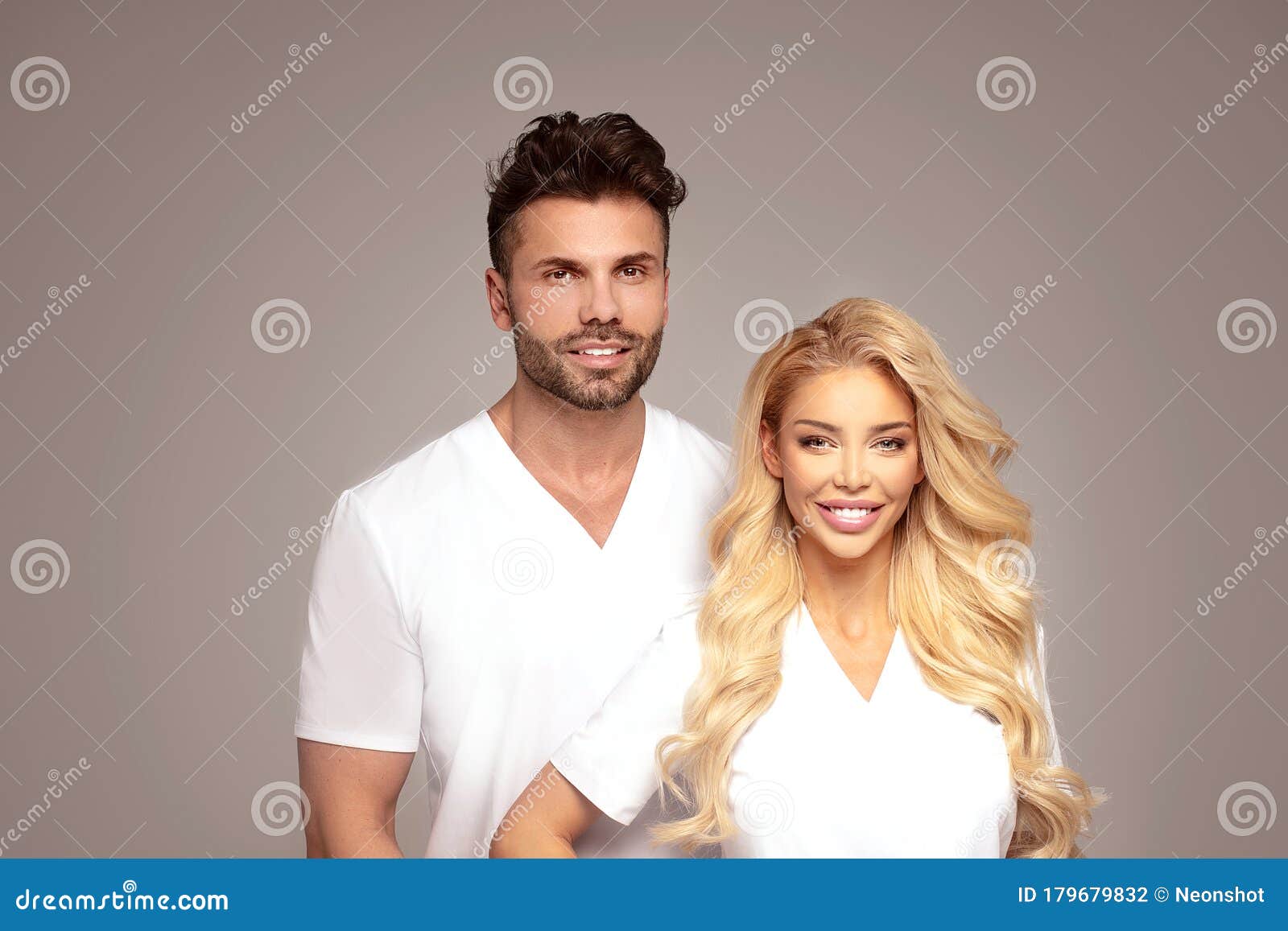 Young Couple of Doctors Posing Stock Photo - Image of clinic, doctor ...