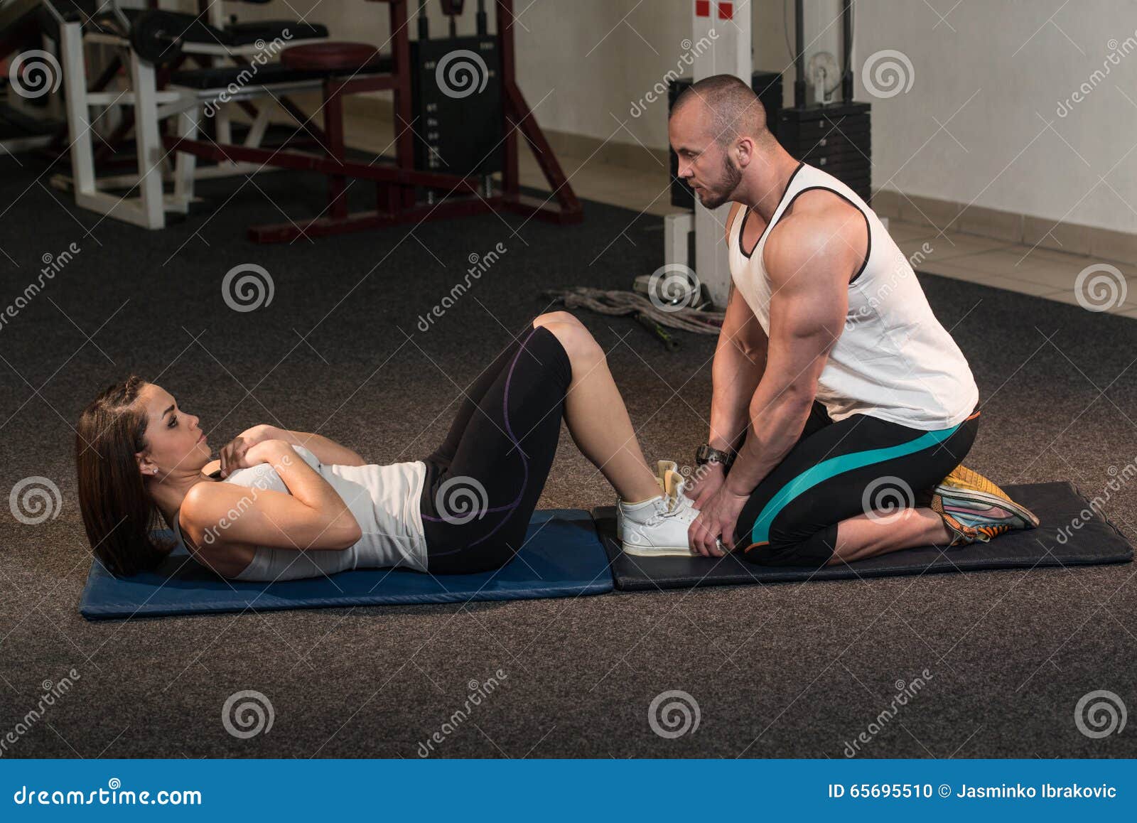 Young Couple Doing Push-Ups in a Gym Stock Photo - Image of bodybuilder ...