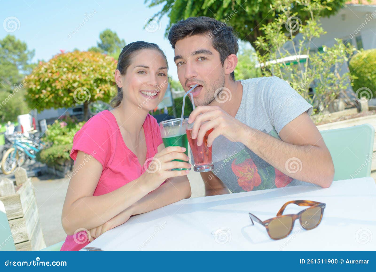 Young Couple Drinking Cocktails Stock Photo - Image of cheerful ...