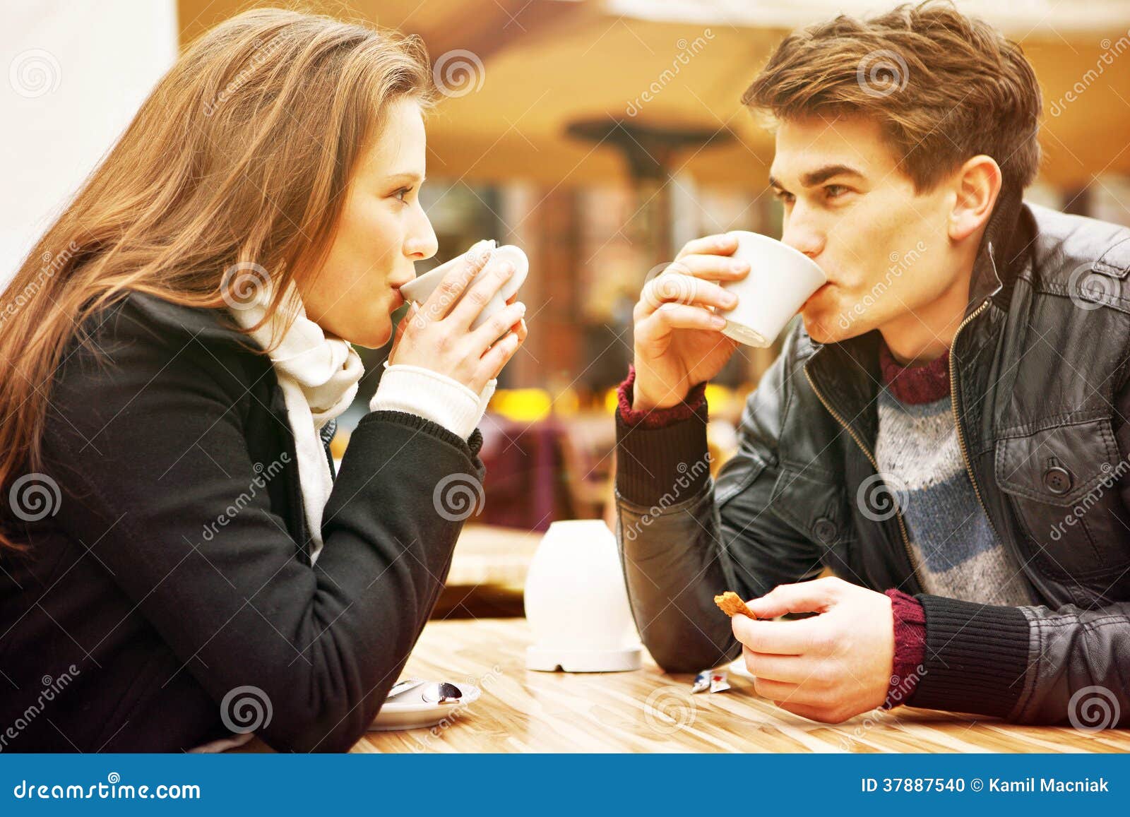 Young Couple Drinking Coffee Stock Photo - Image of women, person: 37887540