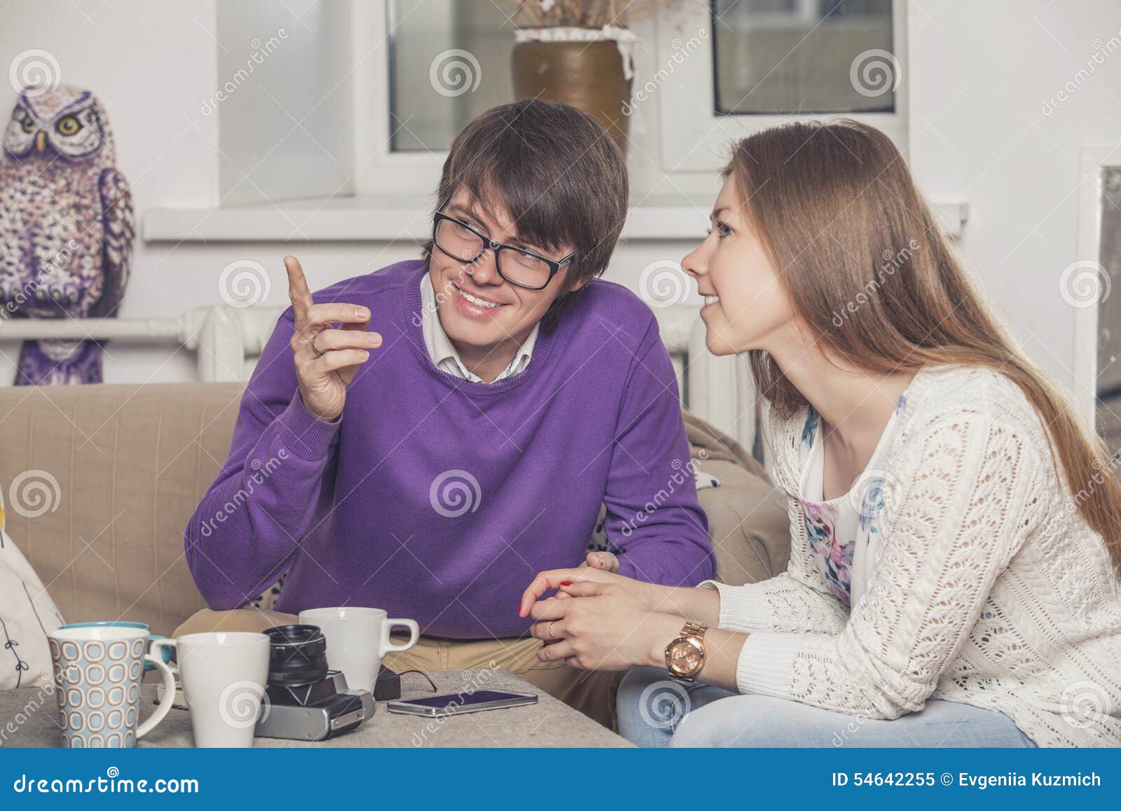 Young Couple Drinking Tea in the Discussion of Ideas Stock Image ...