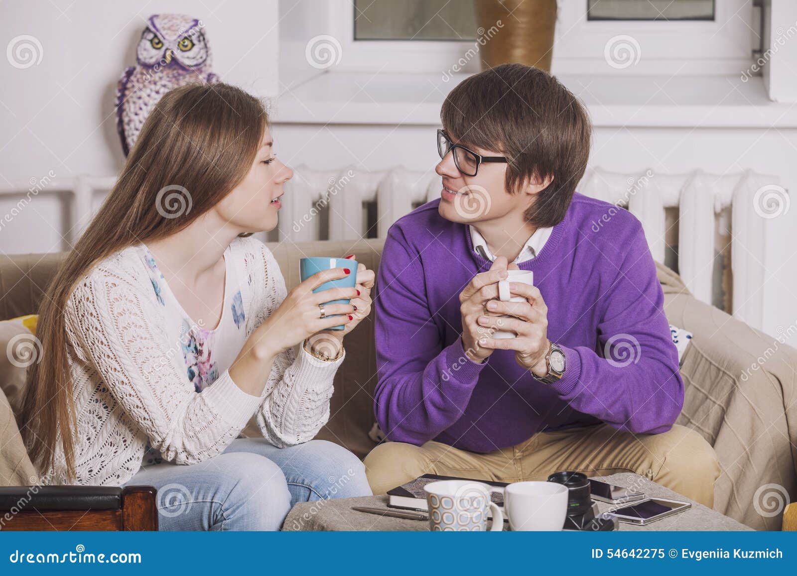 Young Couple Drinking Tea in the Discussion of Ideas Stock Image ...