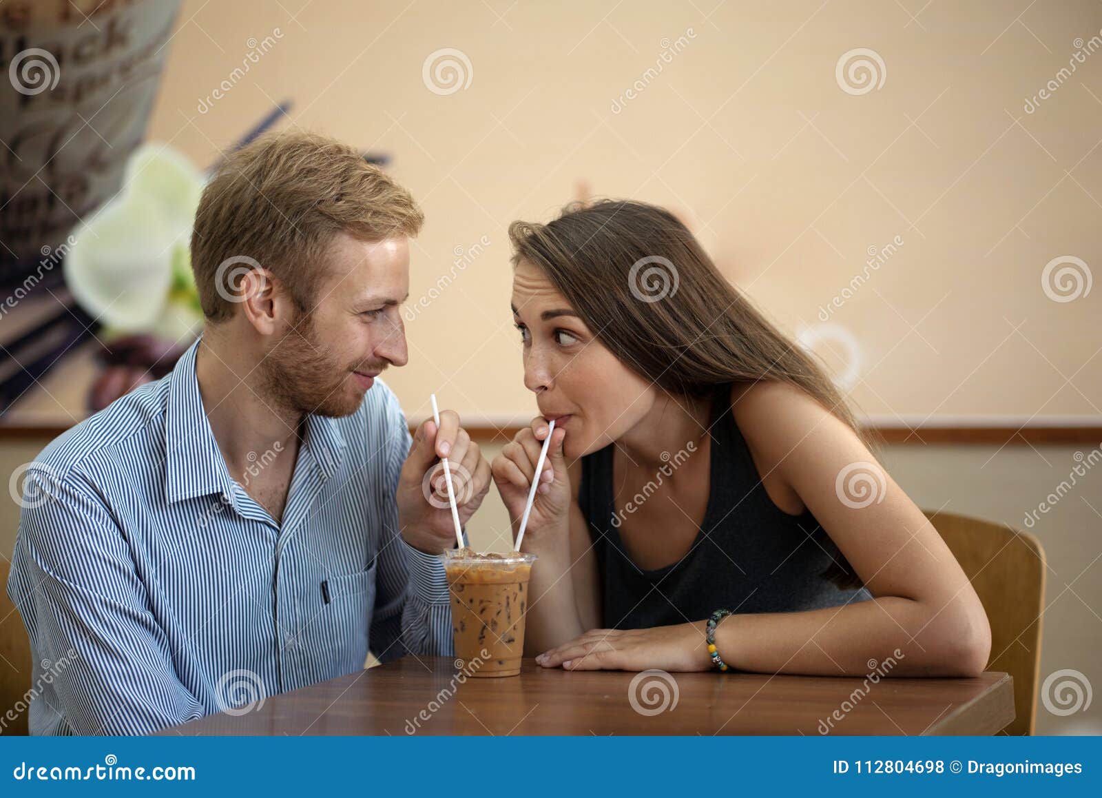 Sharing milkshake stock photo. Image of girlfriend, husband - 112804698