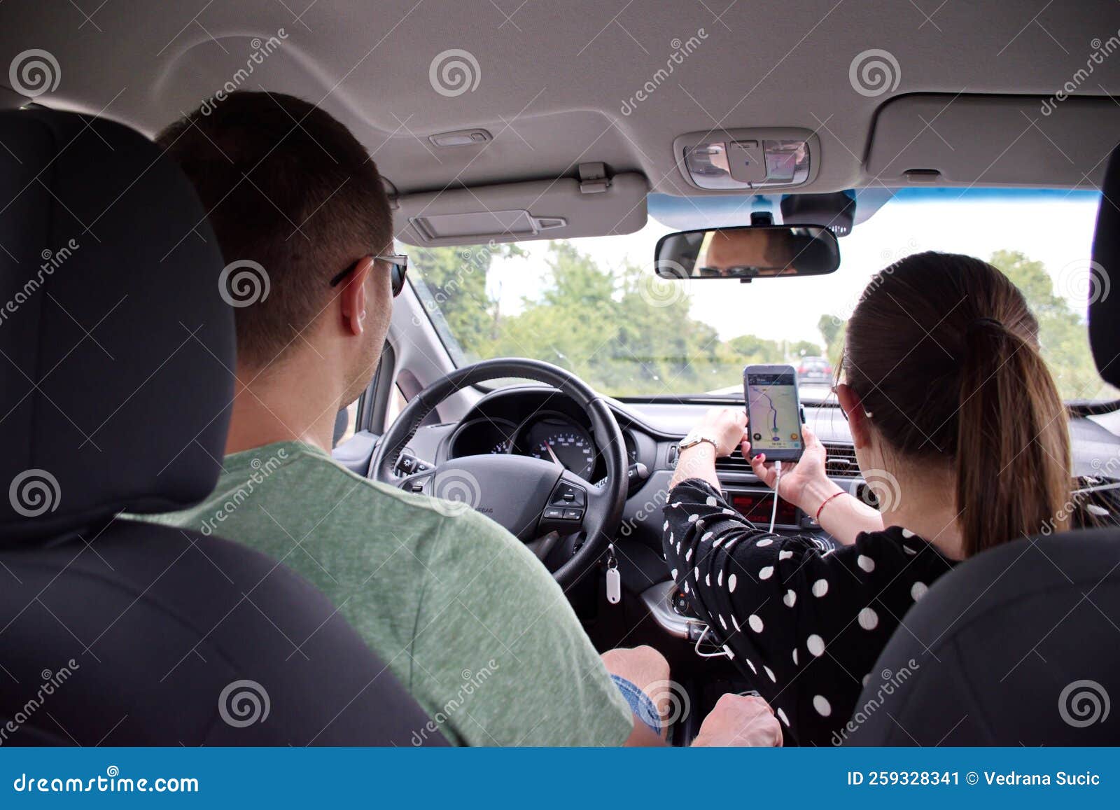 Young Couple Driving in Car and Using Navigation Stock Image - Image of ...