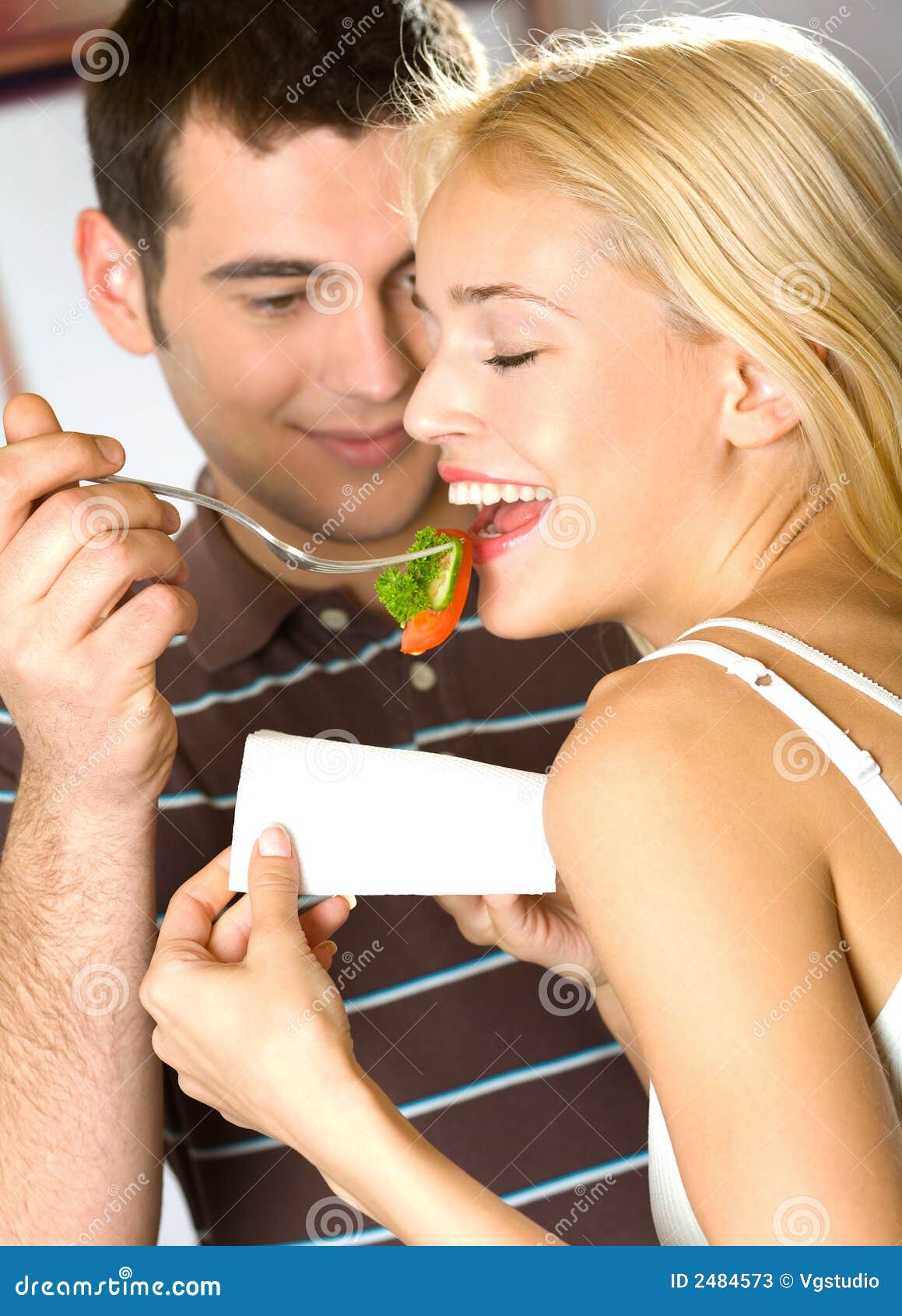 Young Couple Eating Vegetable Stock Image - Image of pair, family: 2484573