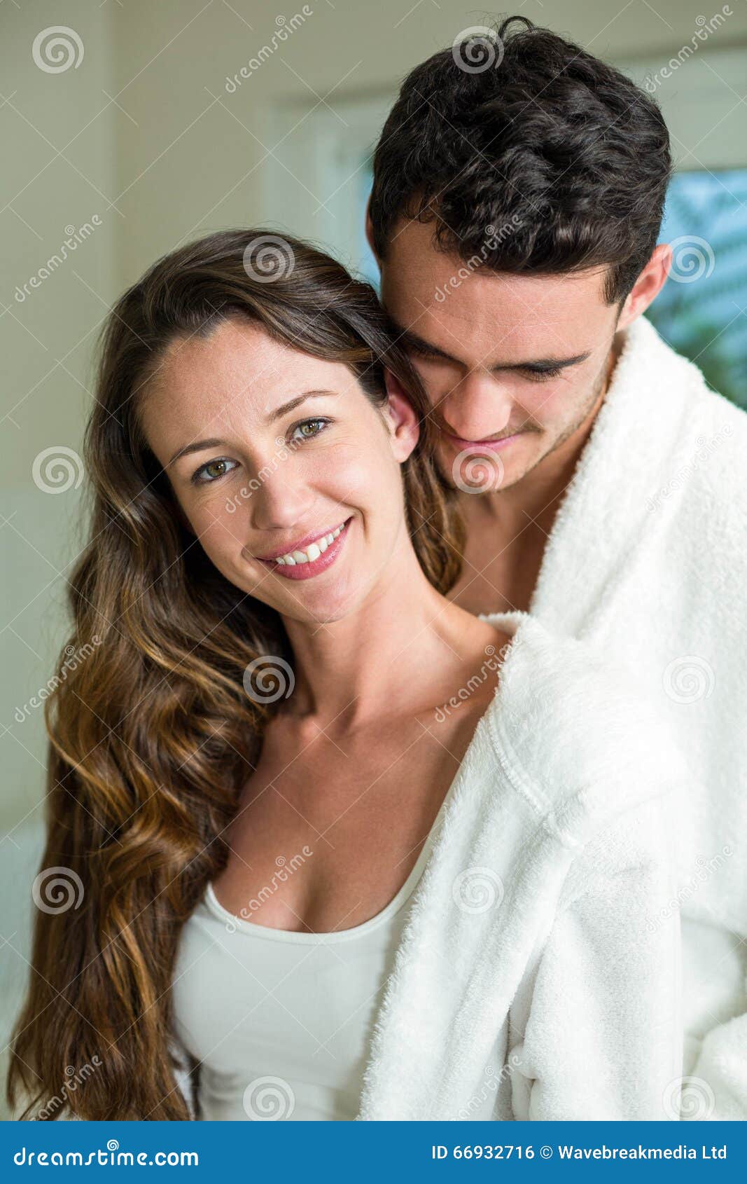 Young Couple Embracing in Bathroom Stock Photo - Image of closeness ...