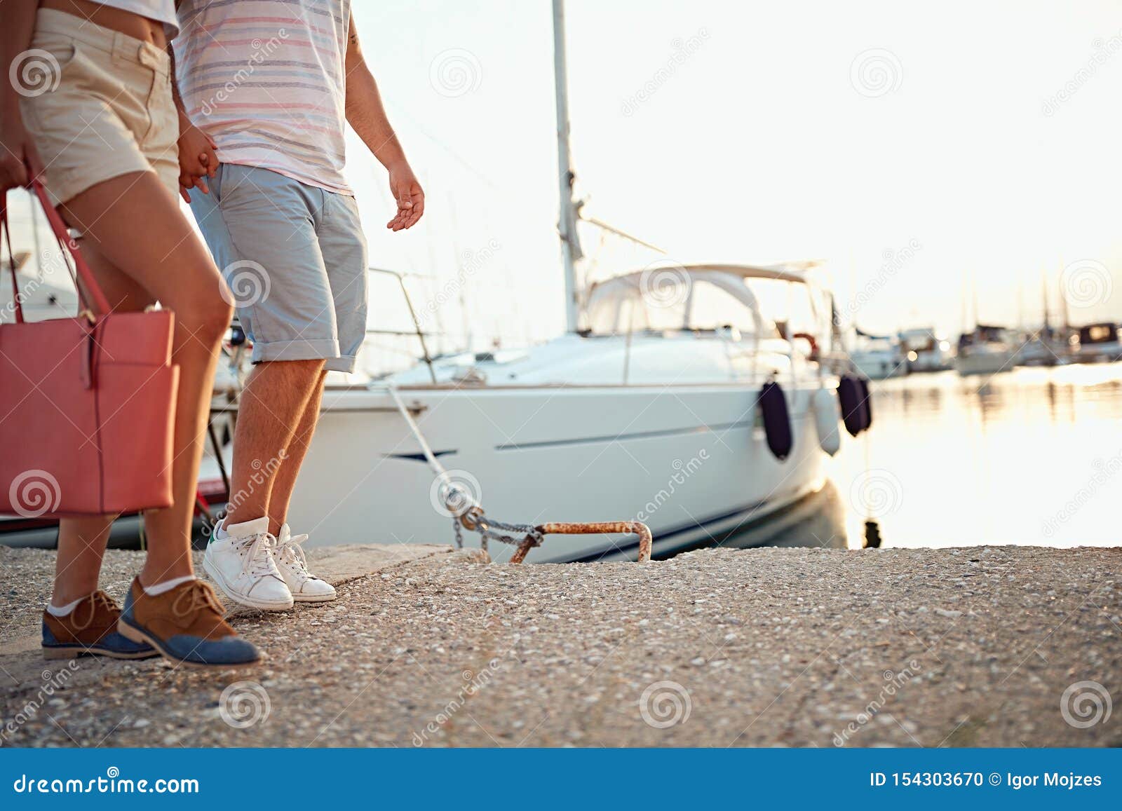 Young Couple Enjoying in Romantic Walking on the Dock Stock Photo ...