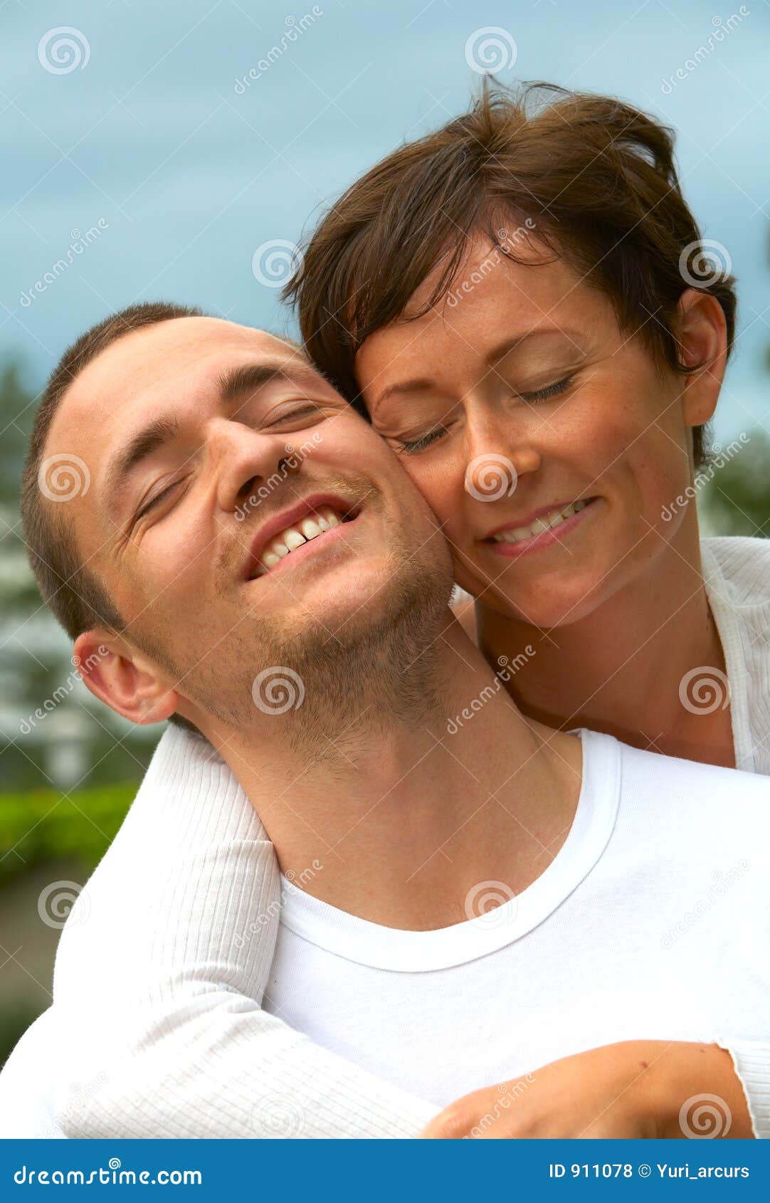 A Young Couple Enjoying the Spring Sun. Stock Photo - Image of casually ...