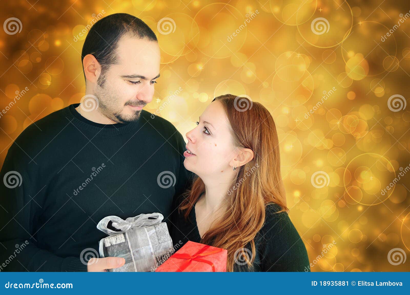Young Couple Exchanging Gifts Stock Image - Image of love, hold: 18935881