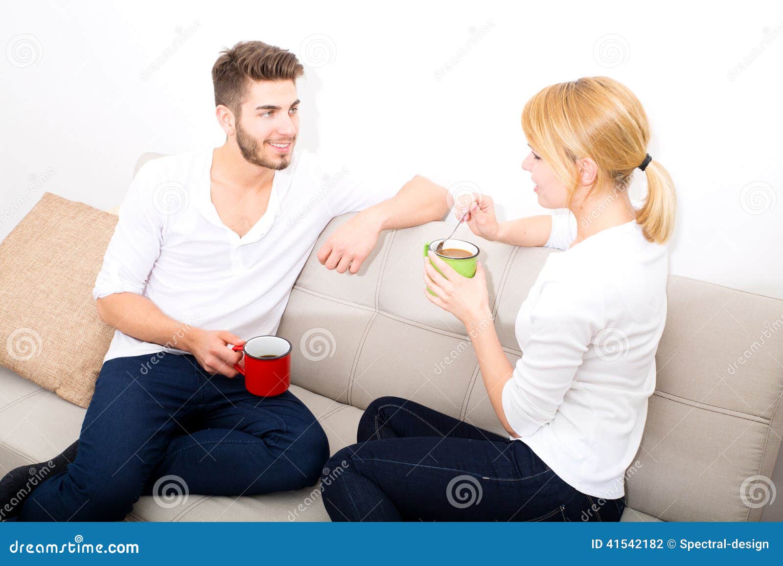 Young Couple Flirting on the Sofa Stock Photo - Image of girl, family ...