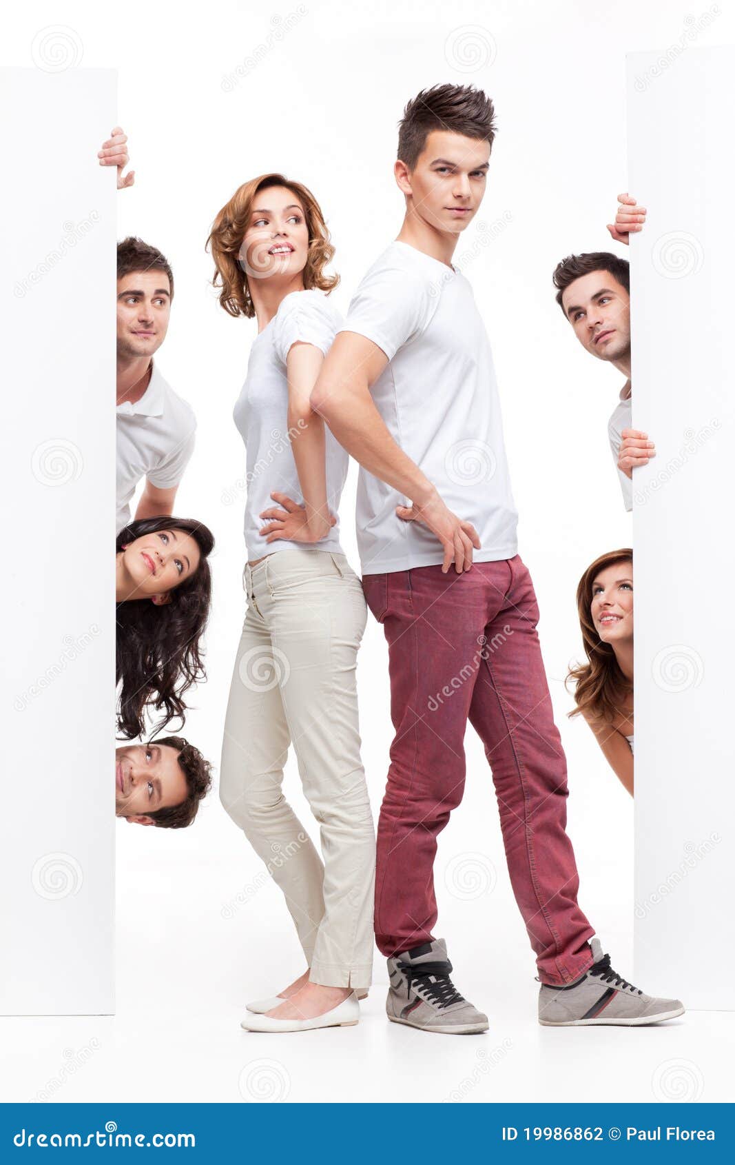 Young Couple and Friends Advertising Stock Photo - Image of cheerful ...