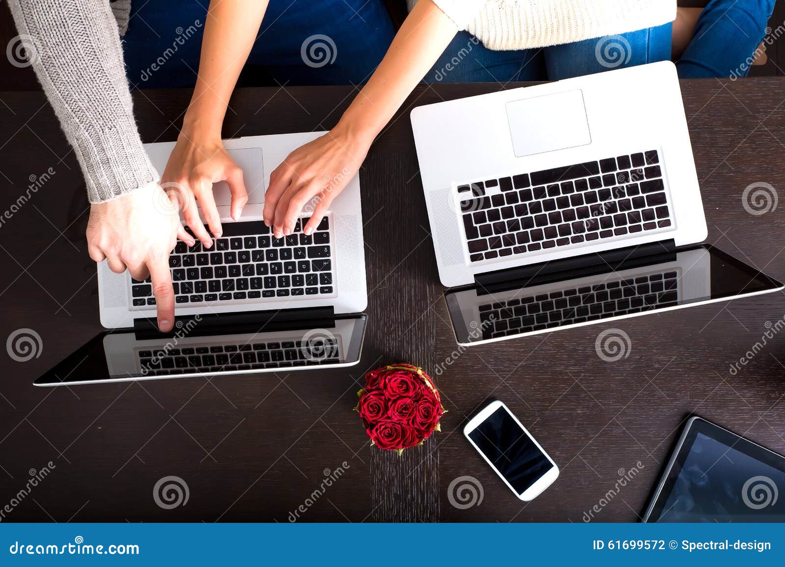 Young Couple in Front of Their Laptop Computers at Home Stock Photo ...