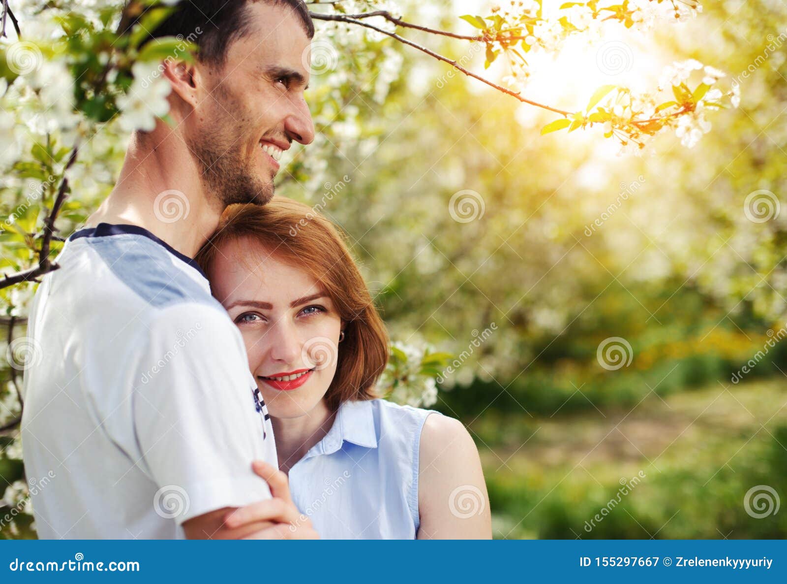 Young couple in the garden stock image. Image of outdoor - 155297667