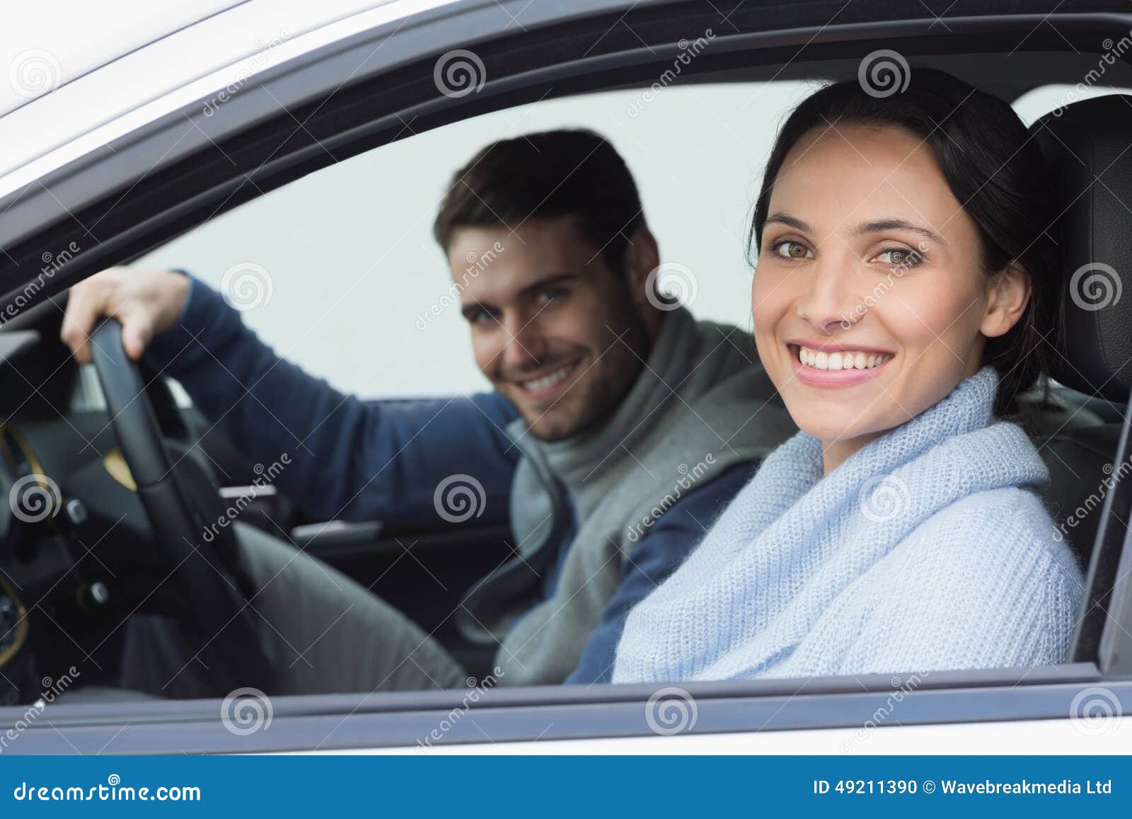 Young Couple Going for a Drive Stock Photo - Image of wheel, land: 49211390