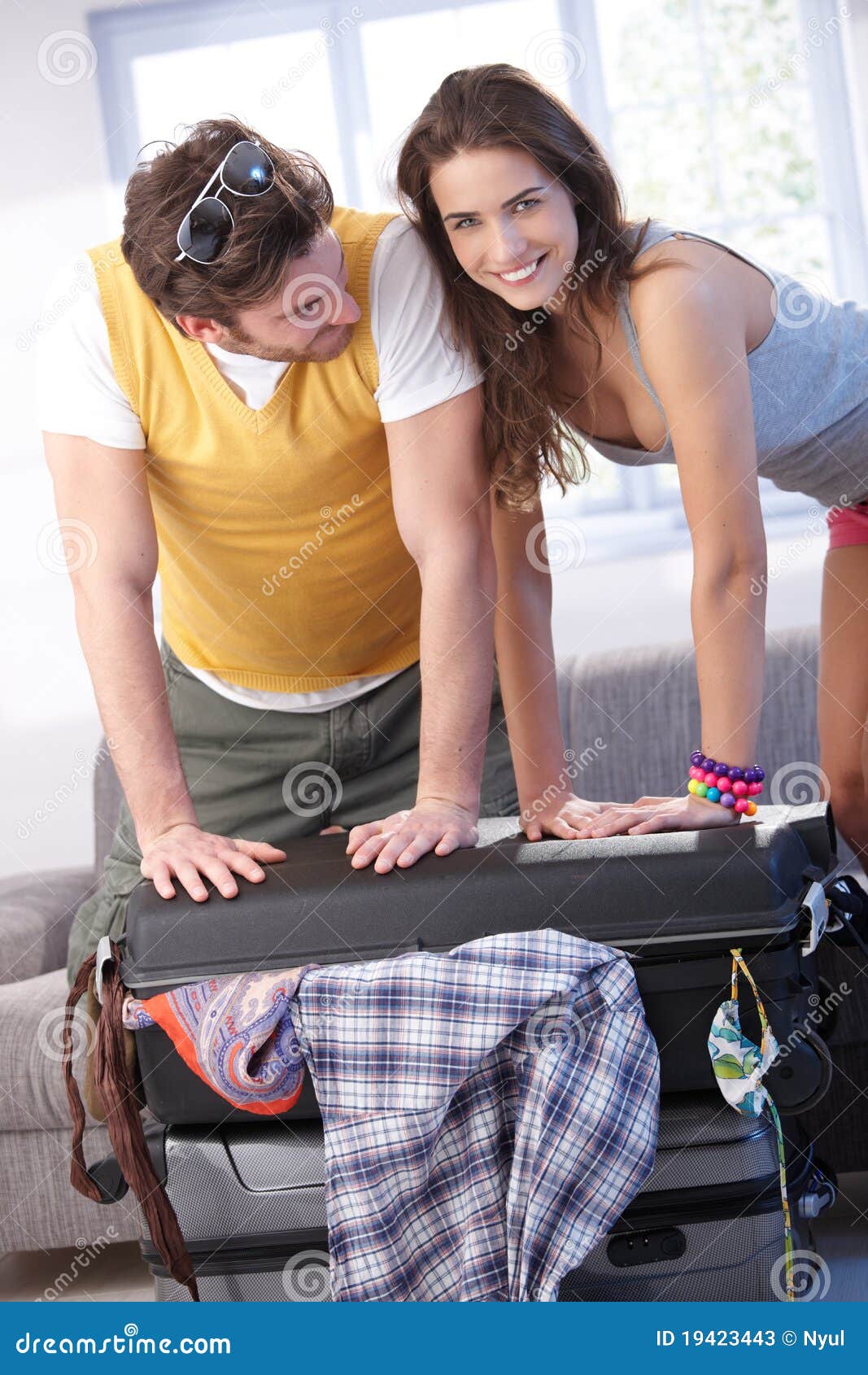 Young Couple Going To Summer Vacation Packing Bag Stock Image - Image ...