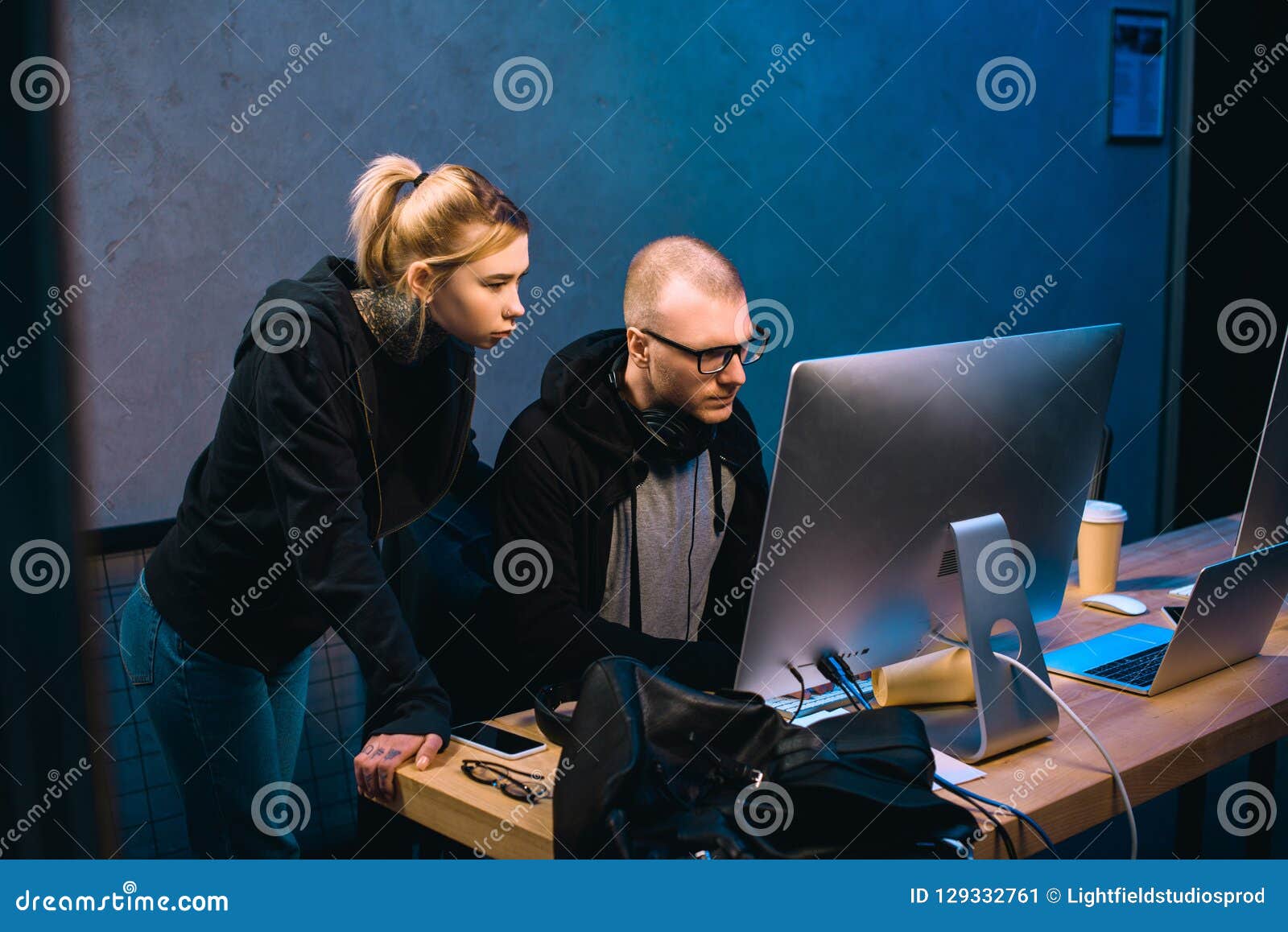 Young Couple of Hackers Looking at Computer Stock Image - Image of ...