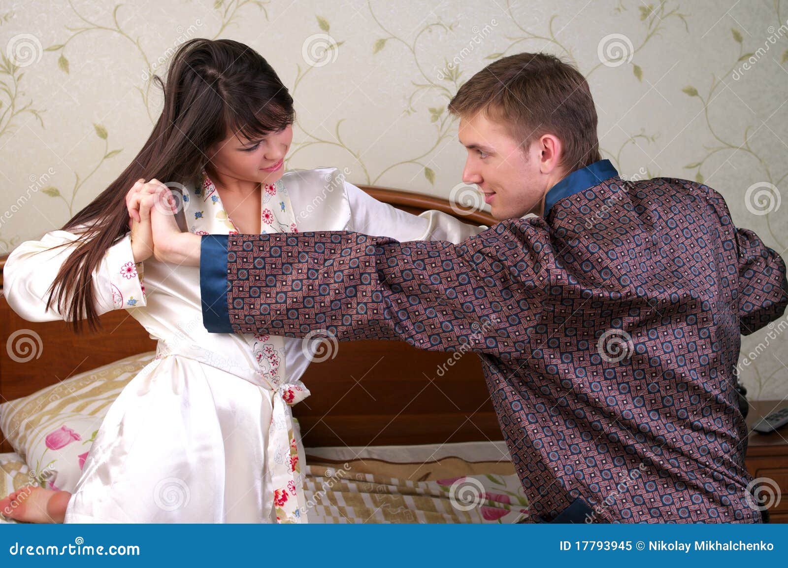 Young Couple Have a Fun Fight Stock Image - Image of bedroom, married ...