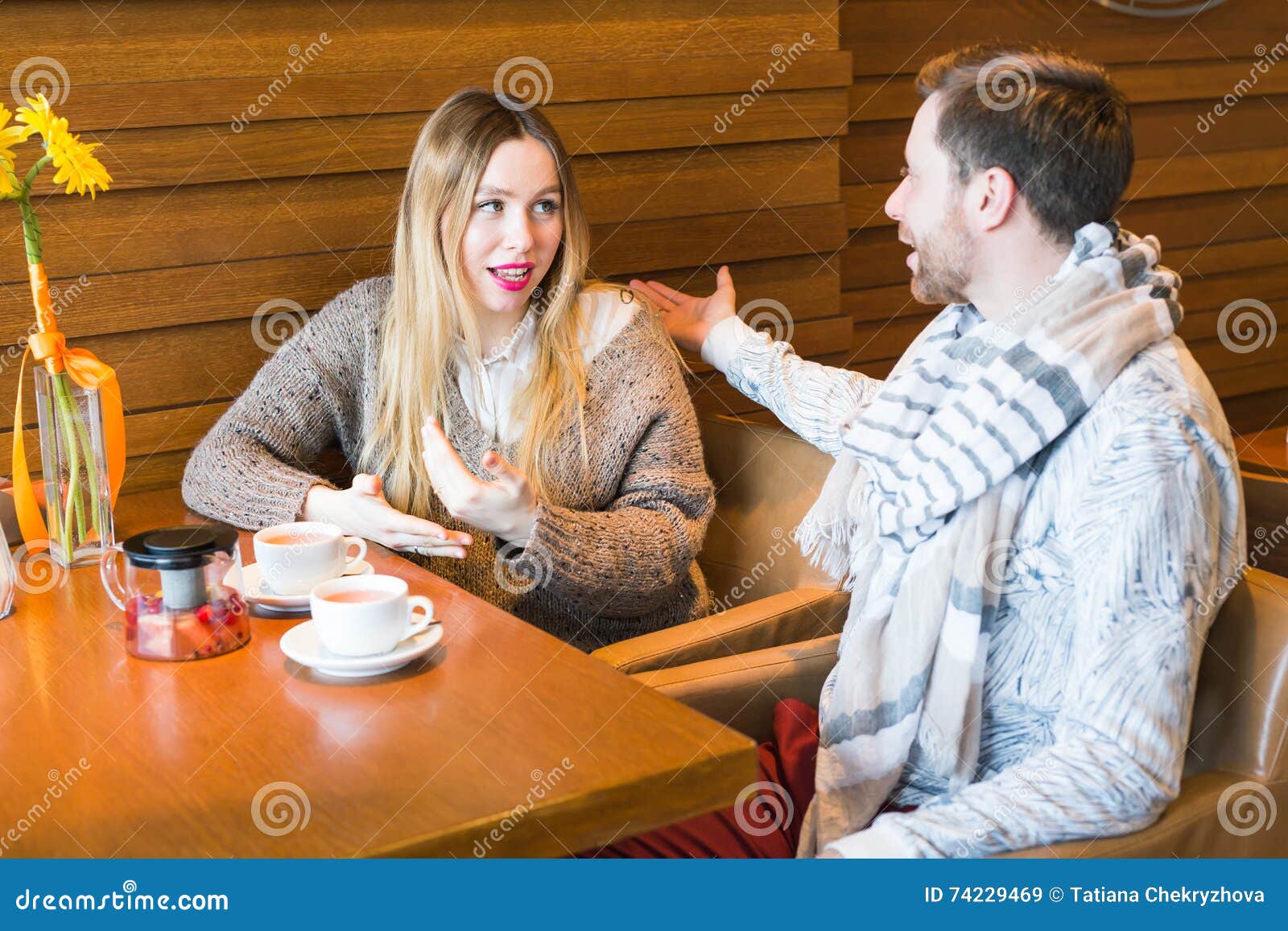 Young Couple Have Interesting Discussion in Cafe Stock Image - Image of ...