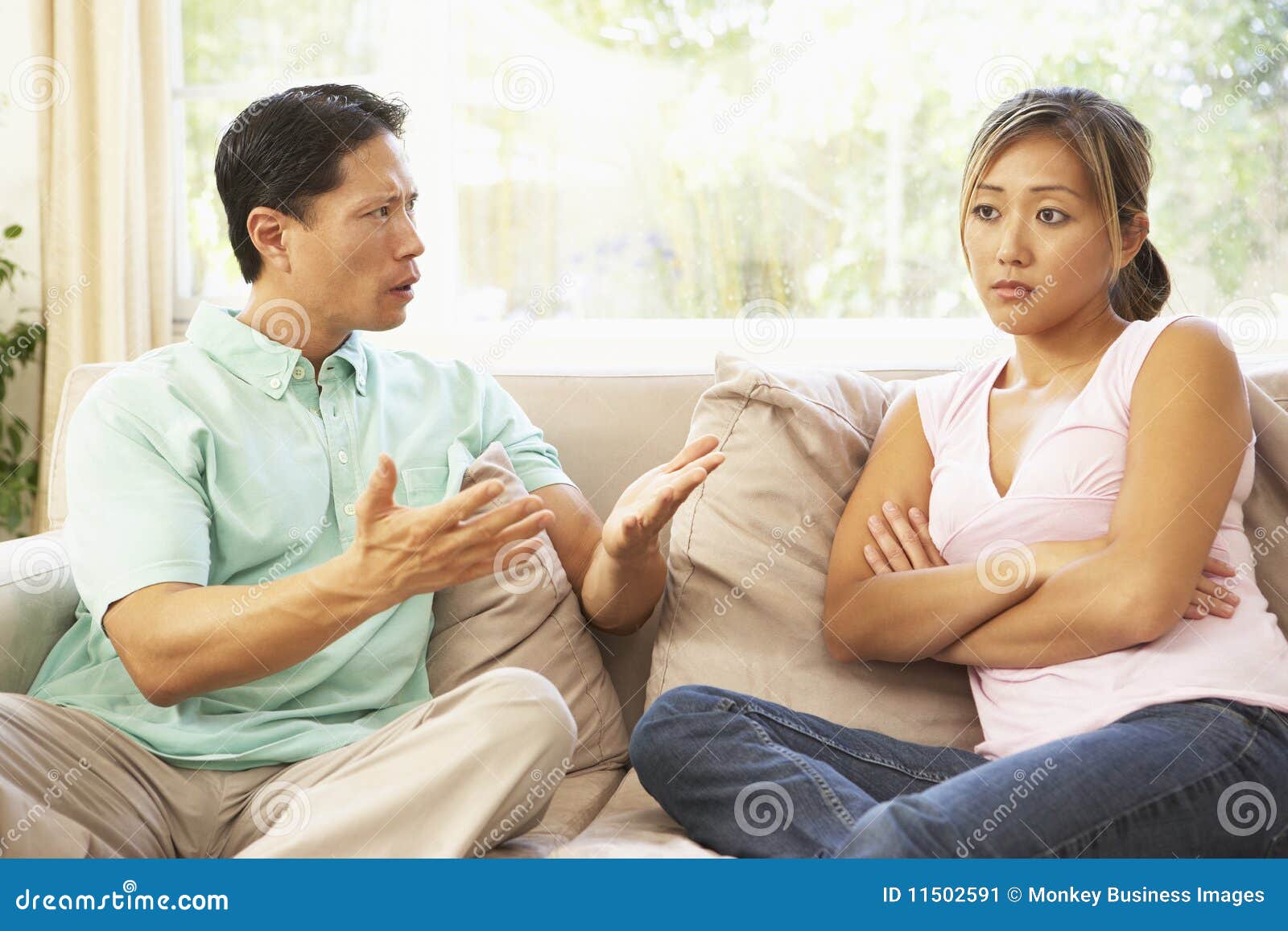 Young Couple Having Argument at Home Stock Image - Image of couple ...