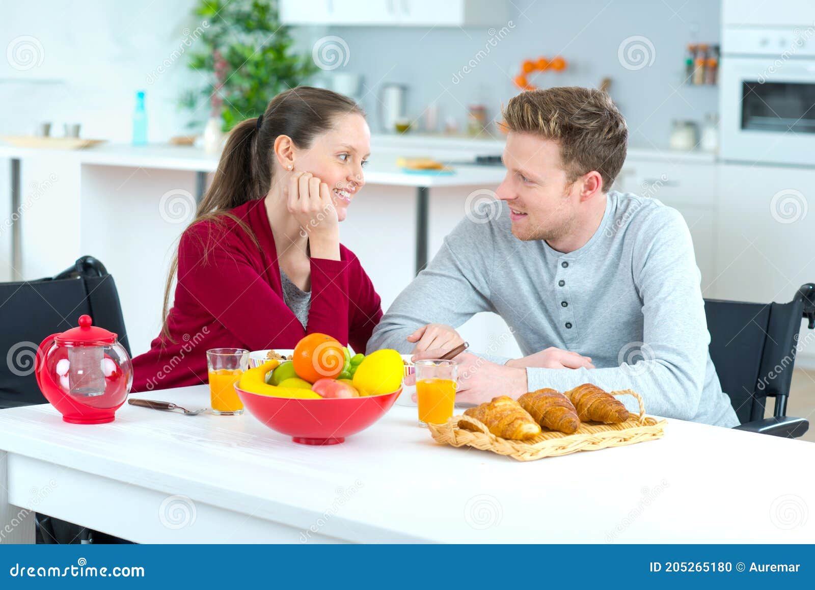 Young Couple Having Breakfast Together at Home Stock Photo - Image of ...