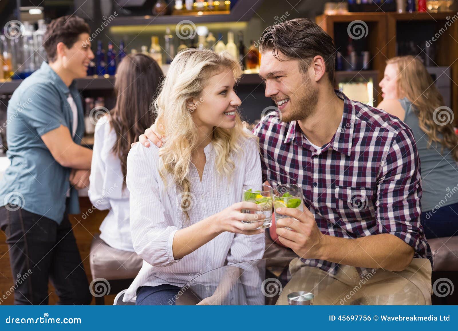 Young Couple Having a Drink Together Stock Photo - Image of five, view ...