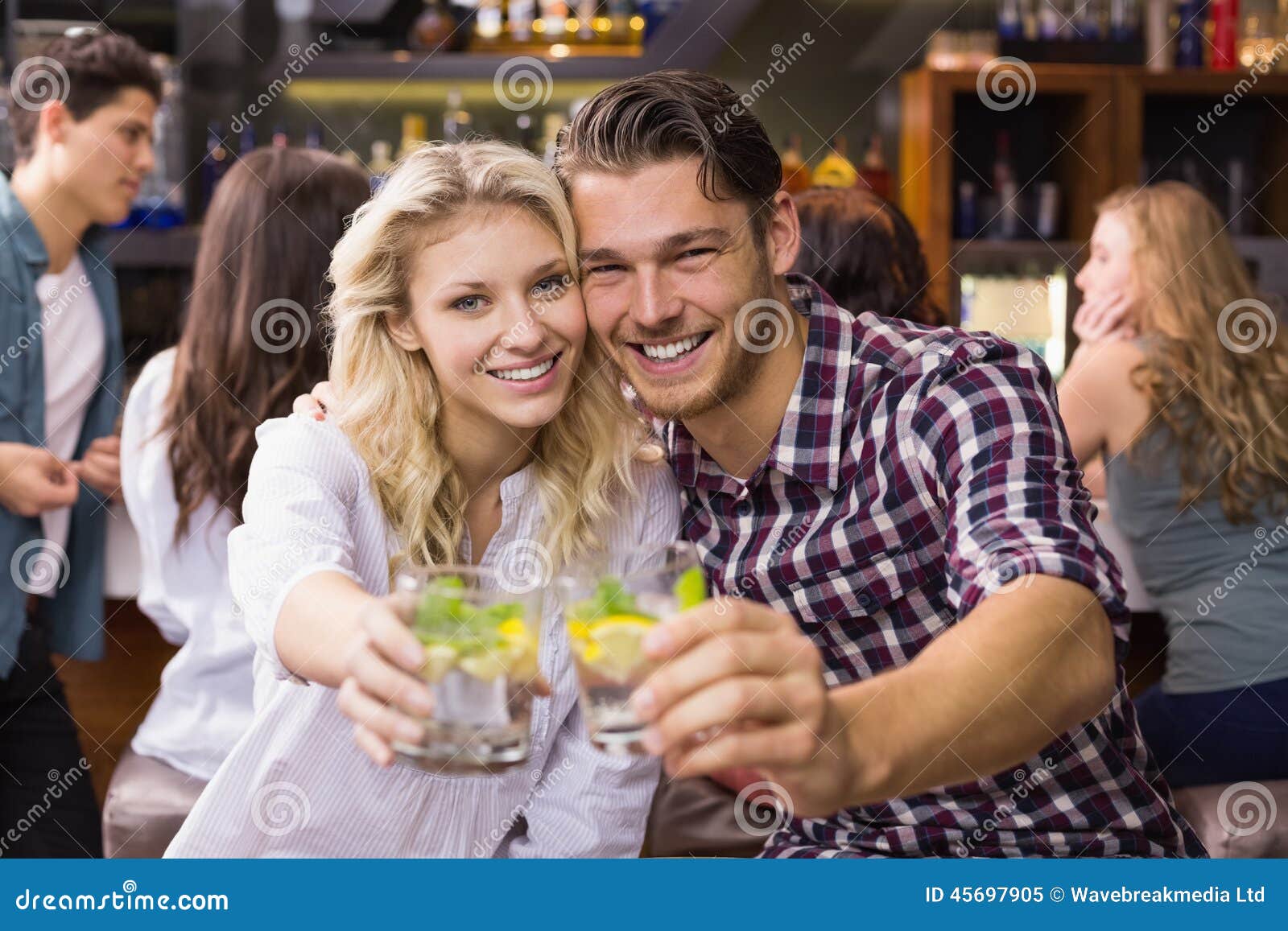 Young Couple Having a Drink Together Stock Image - Image of together ...