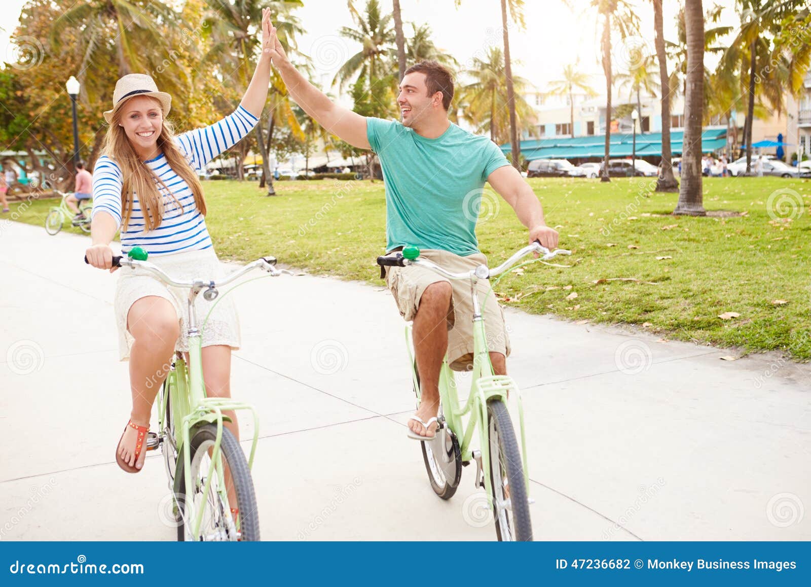 Young Couple Having Fun on Bicycle Ride Stock Photo - Image of nature ...